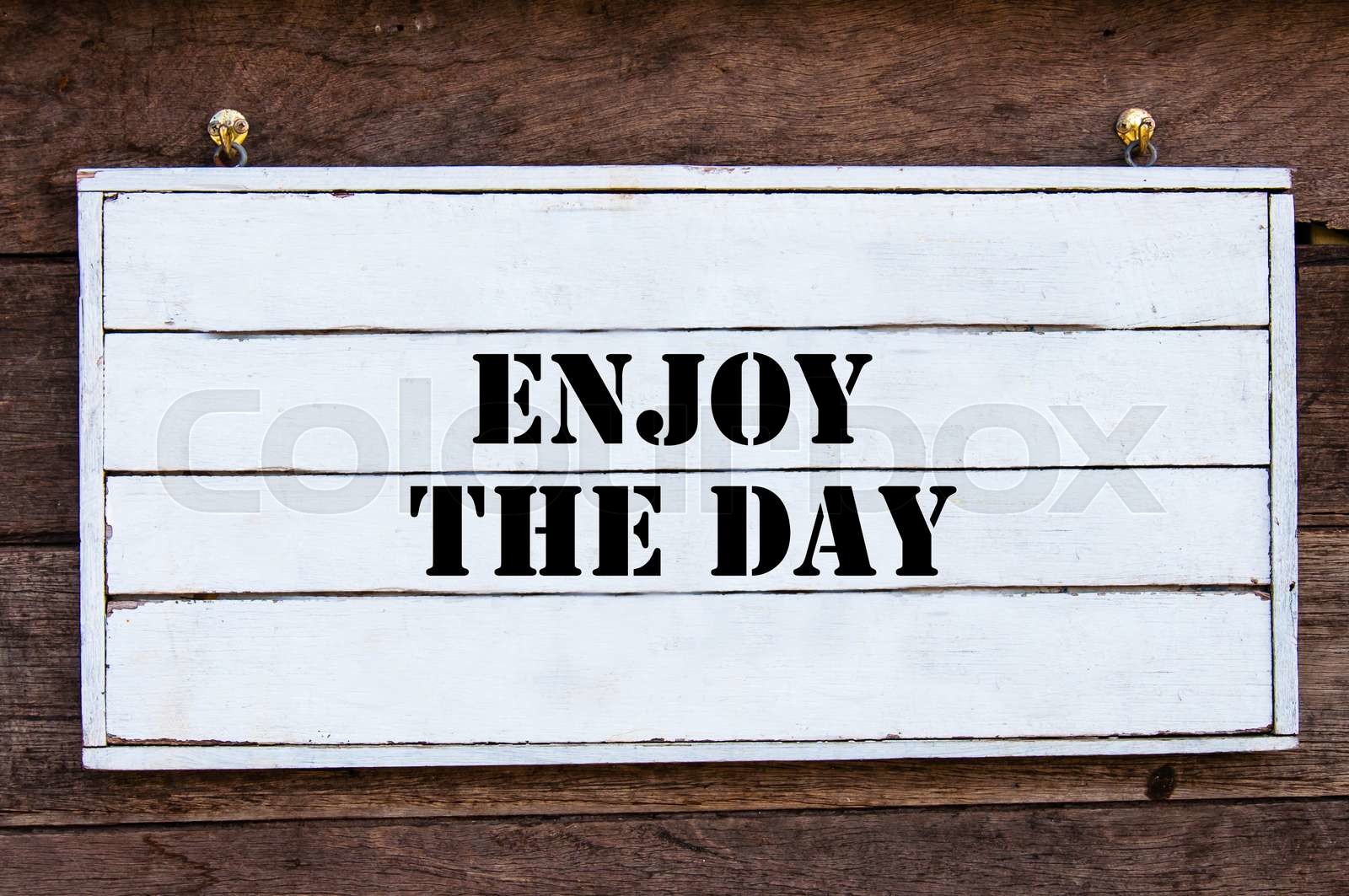 Inspirational message - Enjoy The Day | Stock image | Colourbox