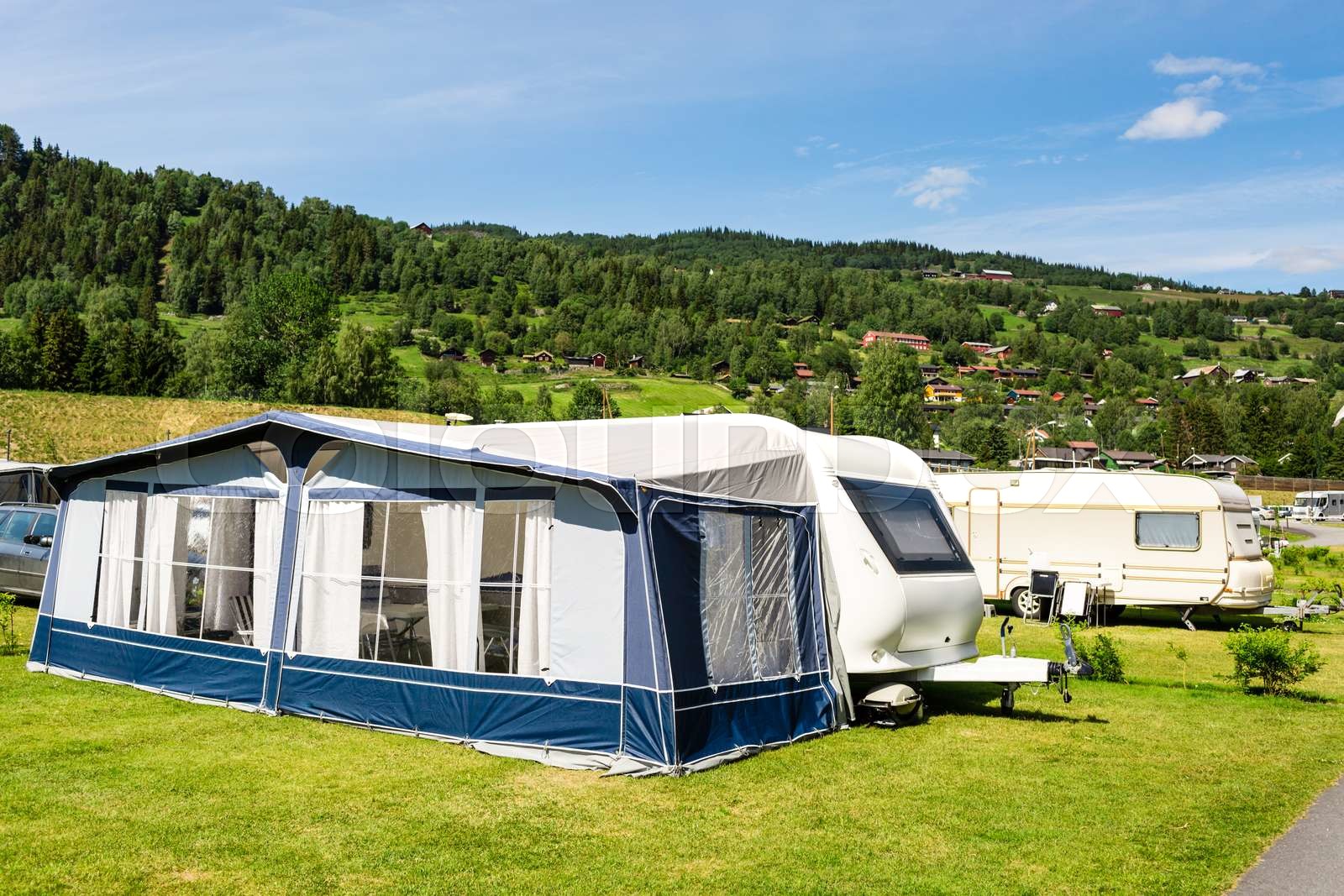 Modern caravan at camping site | Stock image | Colourbox