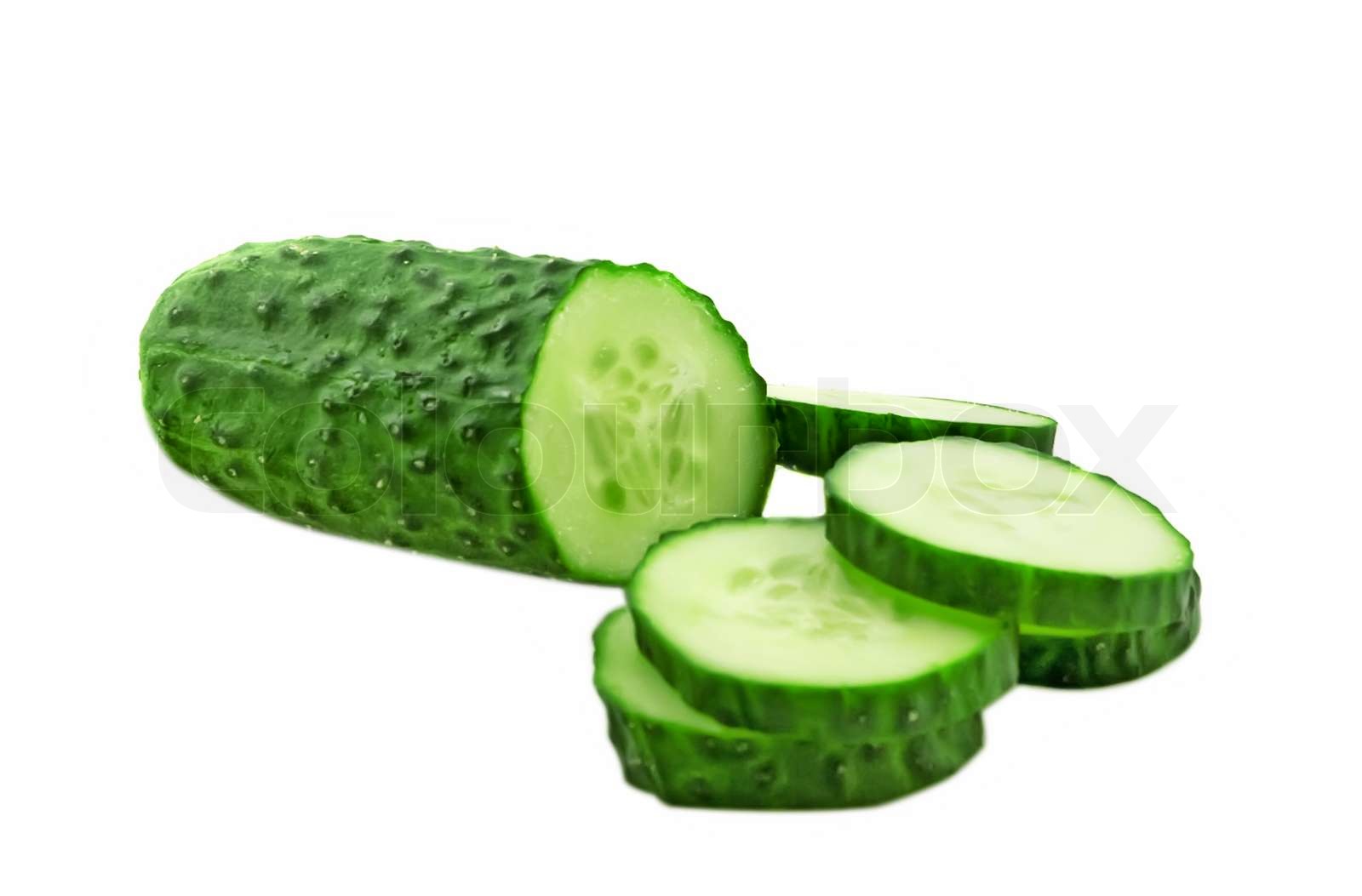 Frisk agurk med skiver isoleret på den hvide | Stock foto | Colourbox