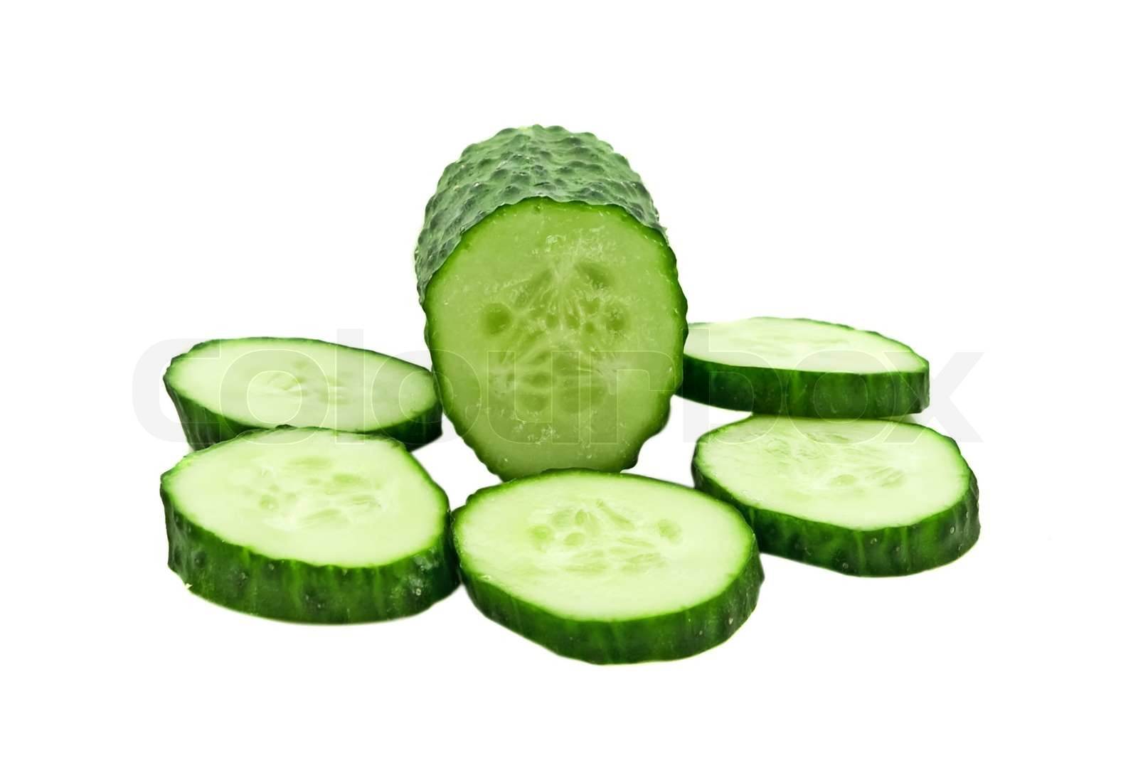 Frisk agurk med skiver isoleret på den hvide | Stock foto | Colourbox
