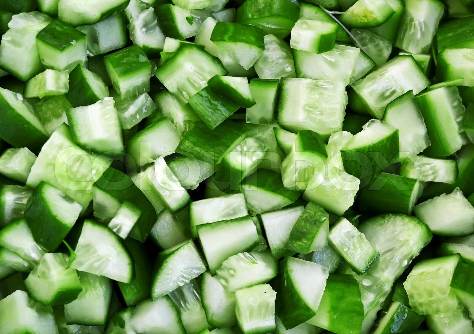 Background from the fresh green chopped cucumbers | Stock image | Colourbox