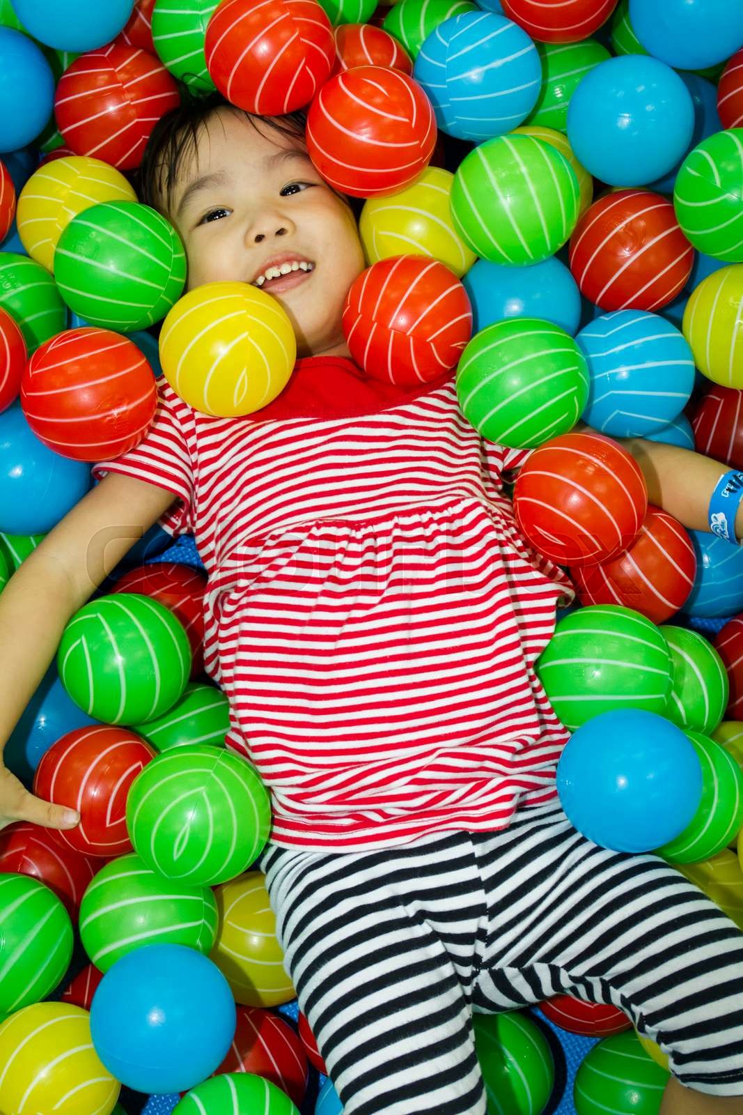 Asian Chinese Girl In Ball Pool | Stock image | Colourbox