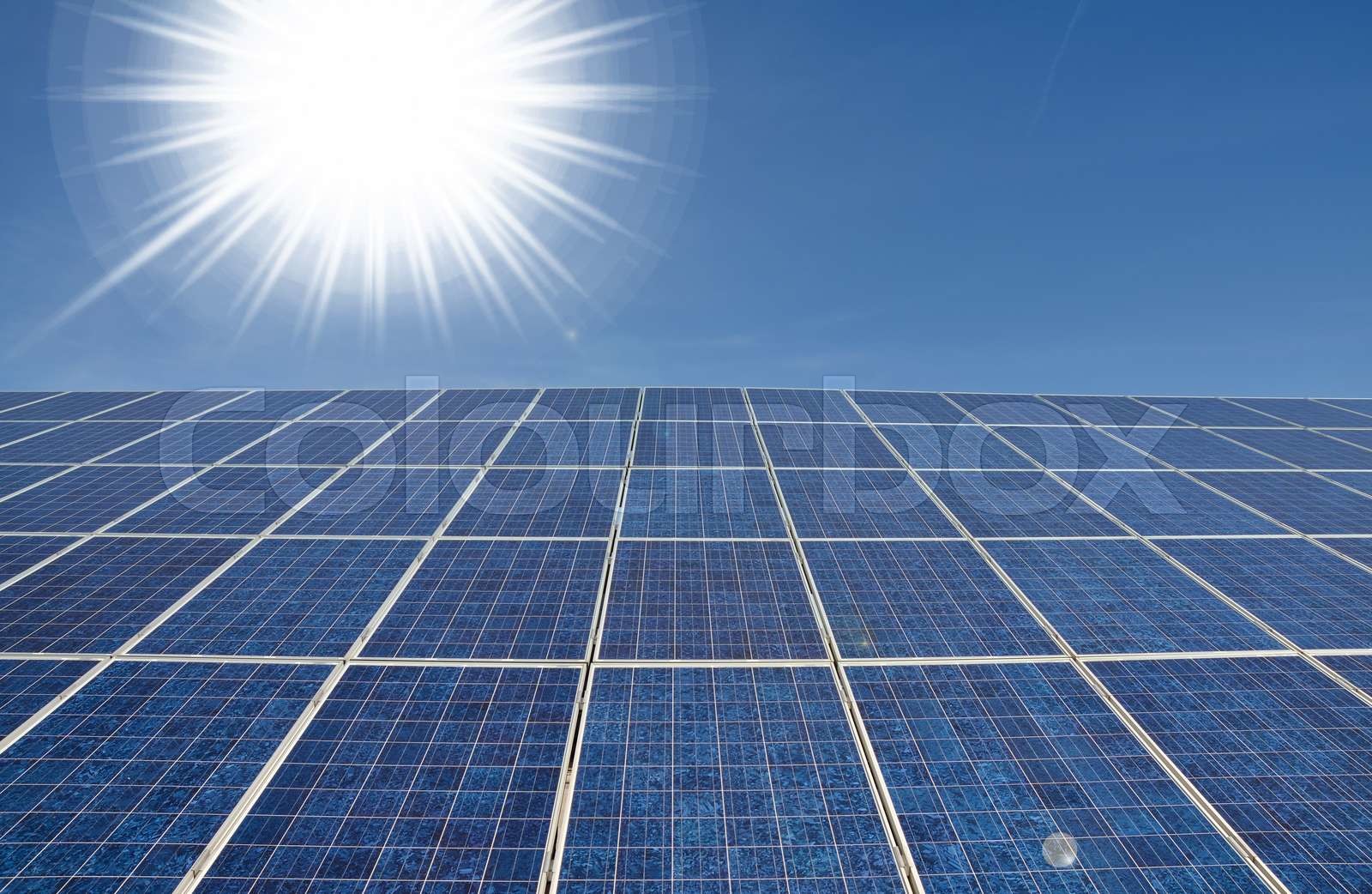 Bright sun with solar panel | Stock image | Colourbox