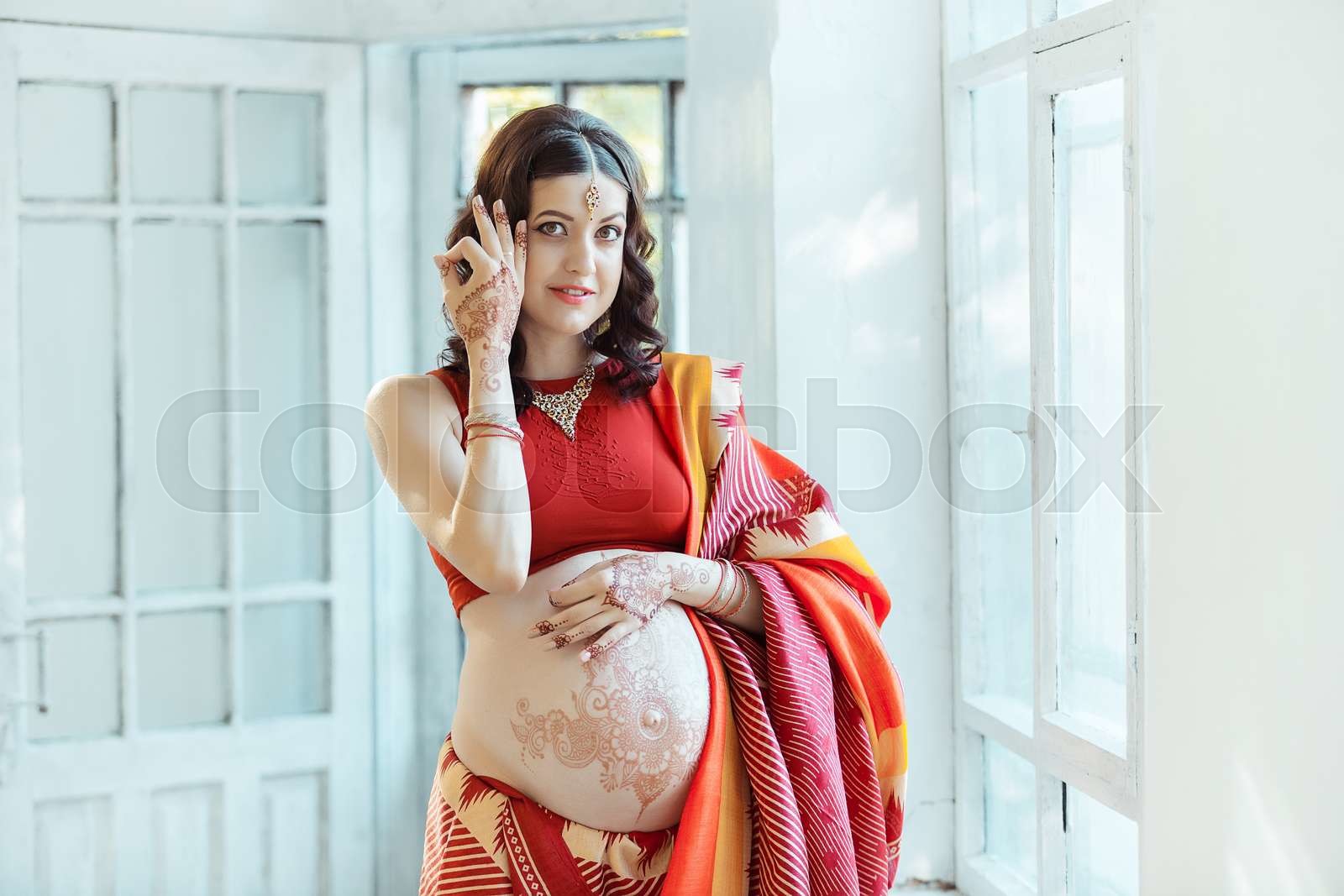The Pregnant Woman Belly With Henna Tattoo Stock Image Colourbox