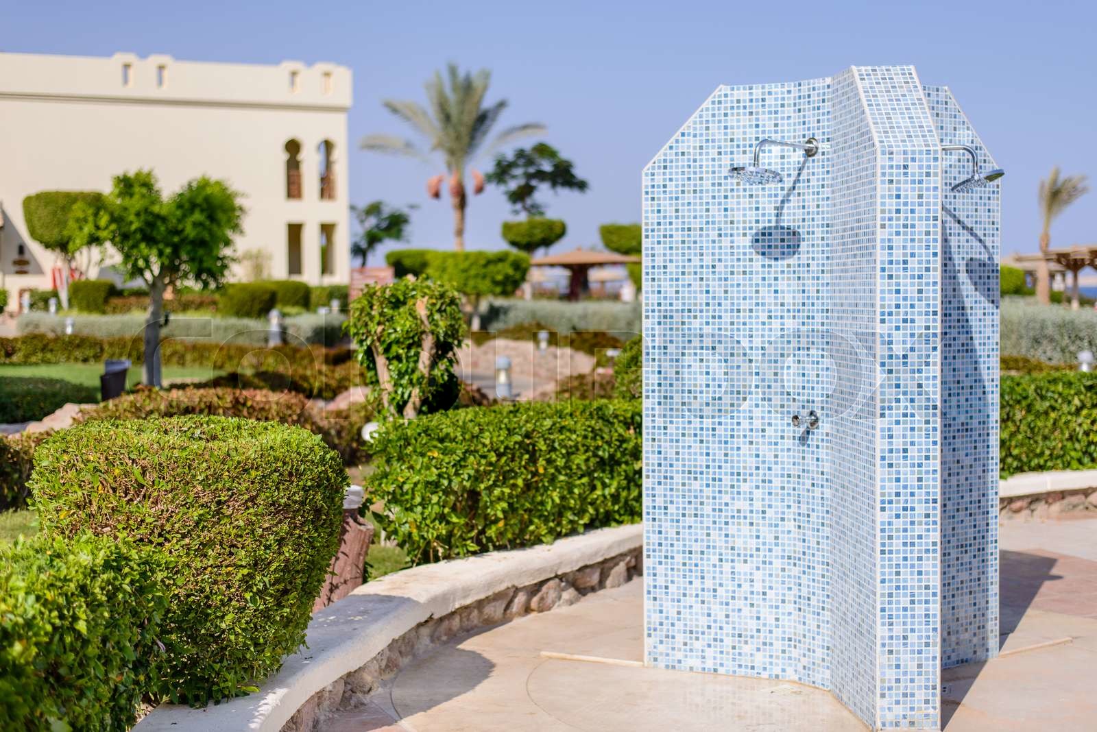 Open-air shower outdoors at a holiday resort | Stock image | Colourbox