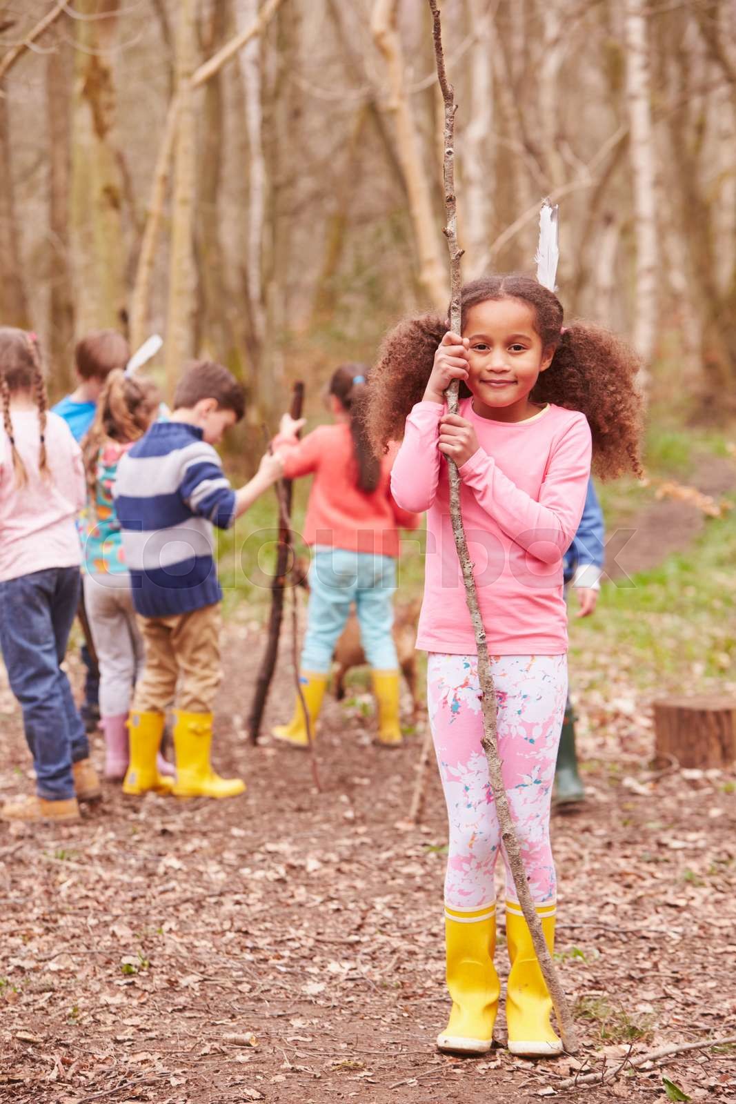 Portrait Of Children Playing Adventure Game In Forest | Stock image ...