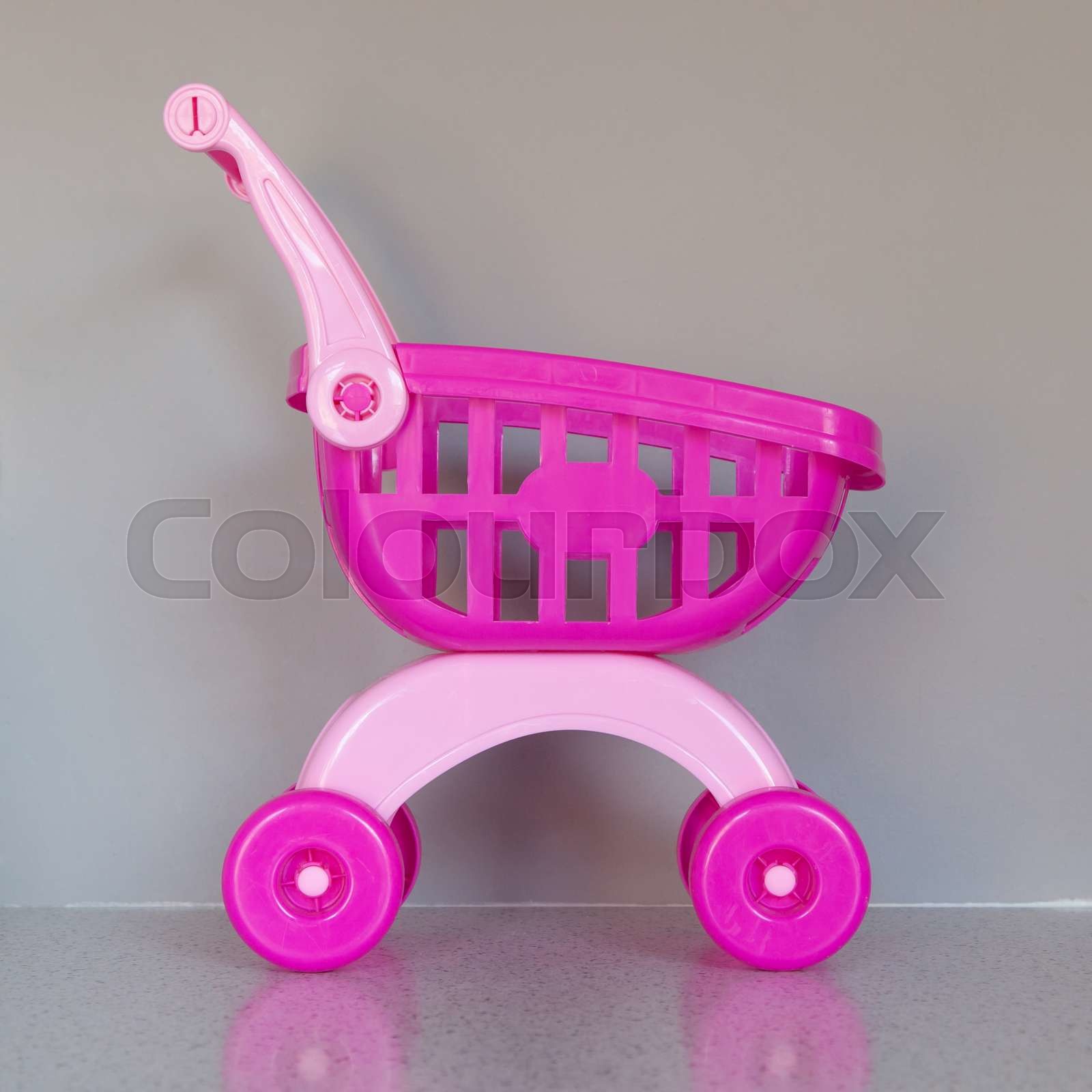 Pink shopping cart | Stock image | Colourbox