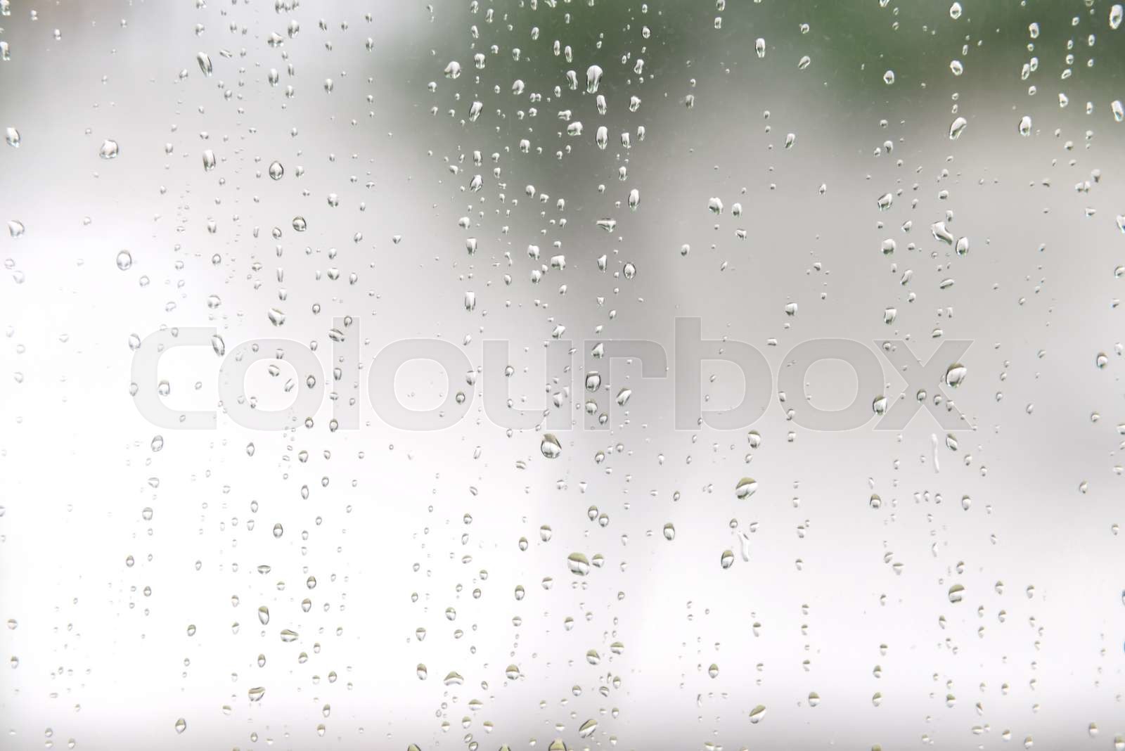water drop on glass and dripping down | Stock image | Colourbox