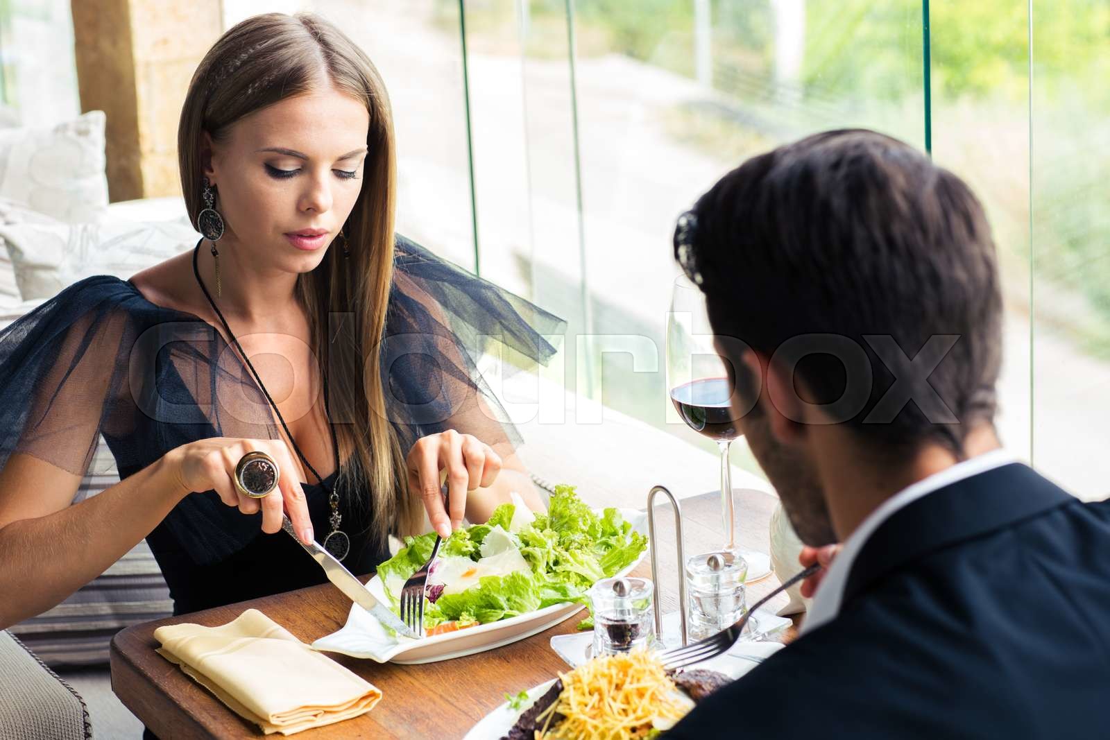 Couple eating in restaurant | Stock image | Colourbox