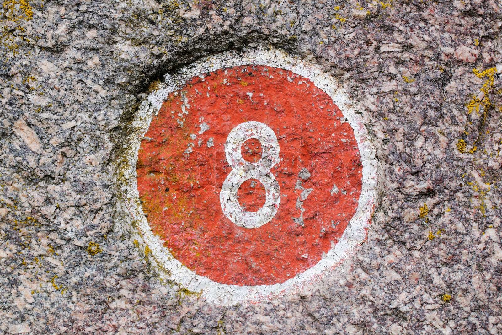 Number 8 painted inside a red circle | Stock image | Colourbox