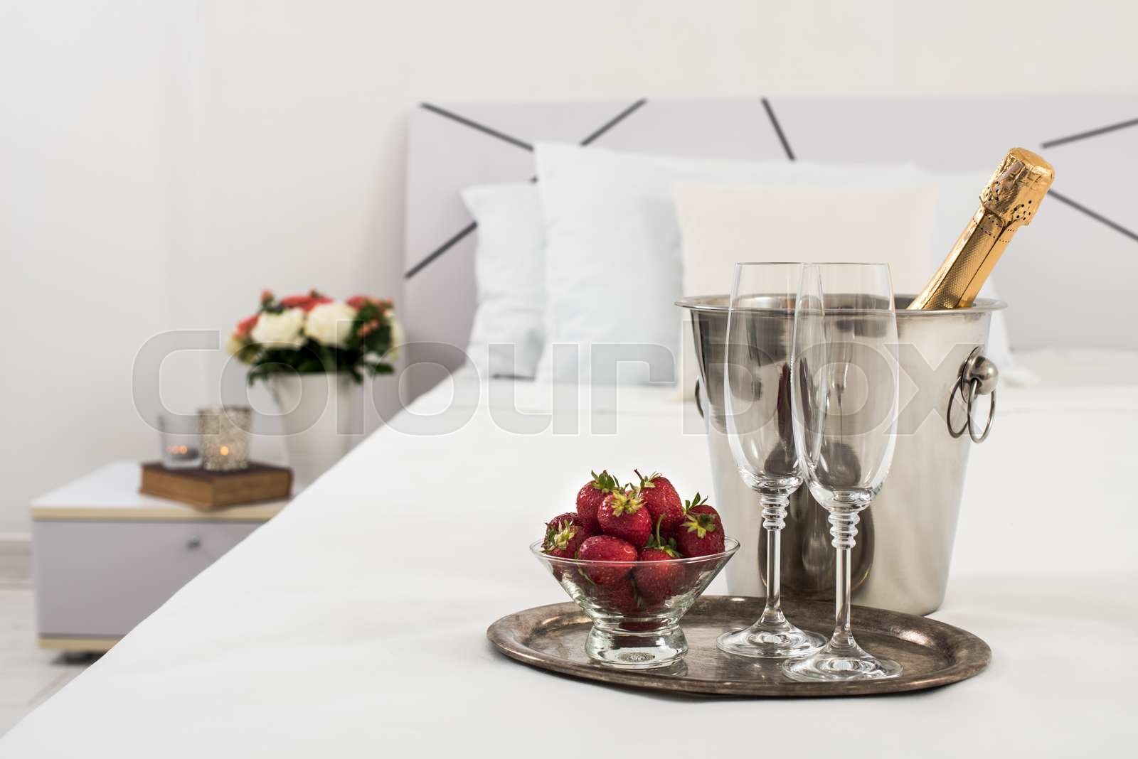 Champagne in bed | Stock image | Colourbox