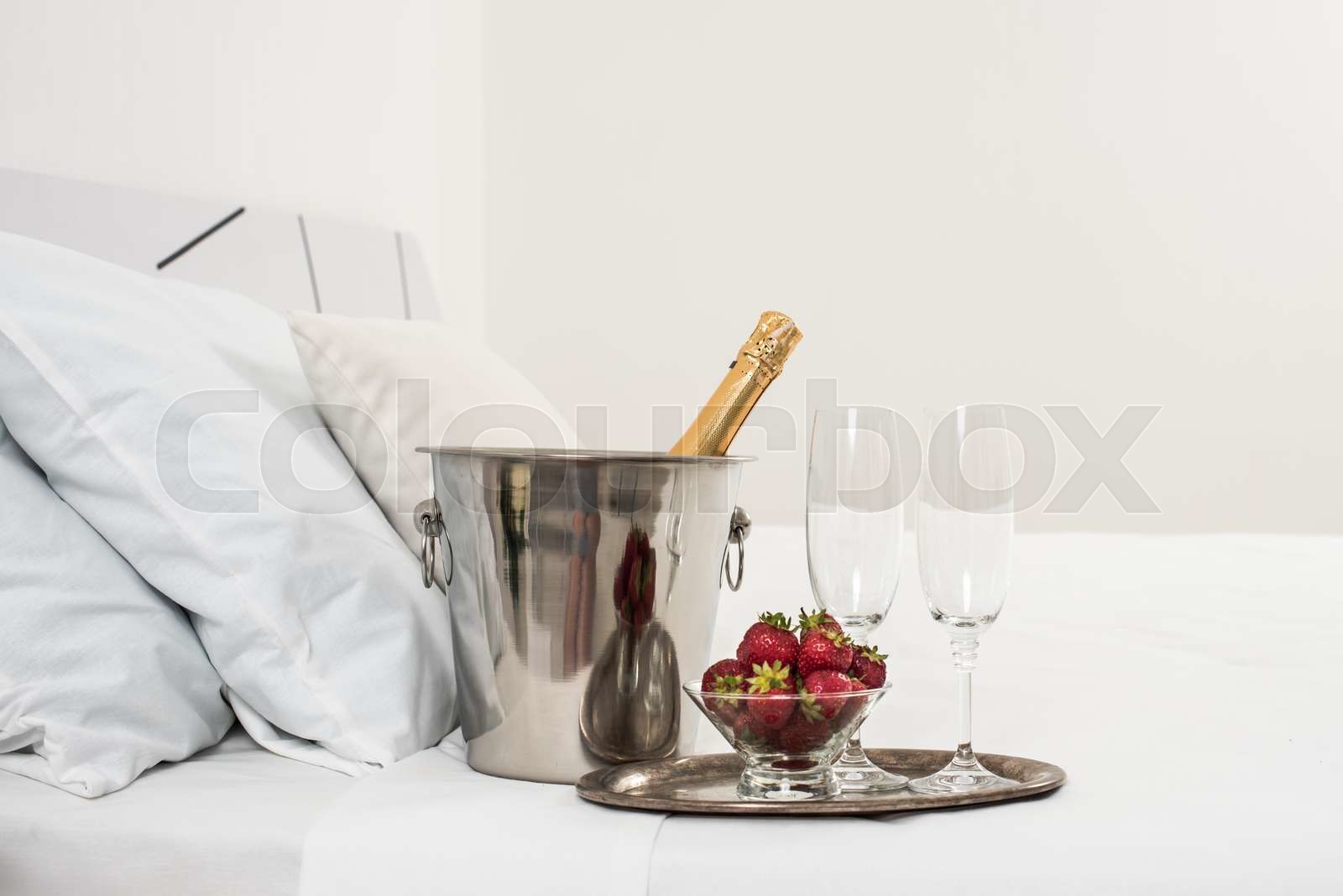Champagne in bed | Stock image | Colourbox