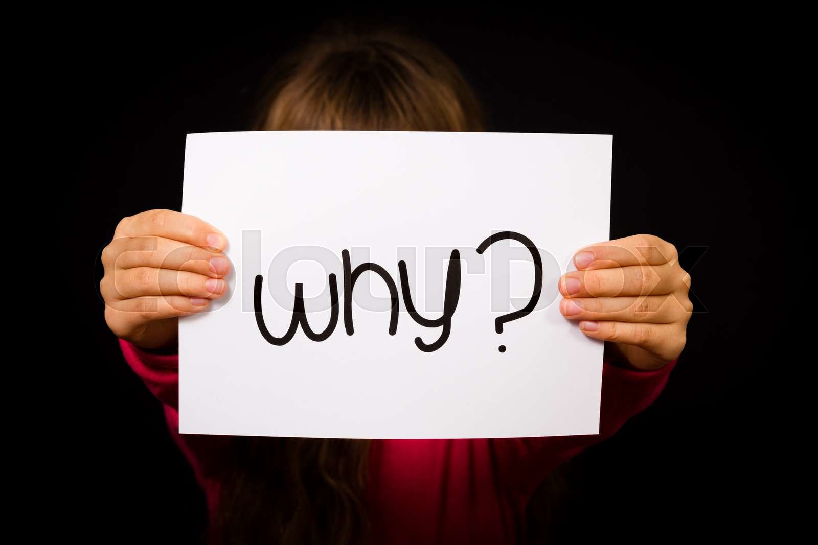 Child holding Why sign | Stock image | Colourbox