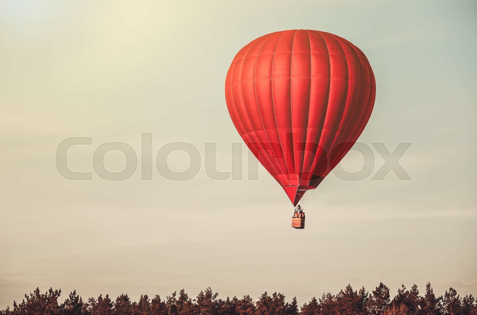 Red balloon in the sky | Stock image | Colourbox