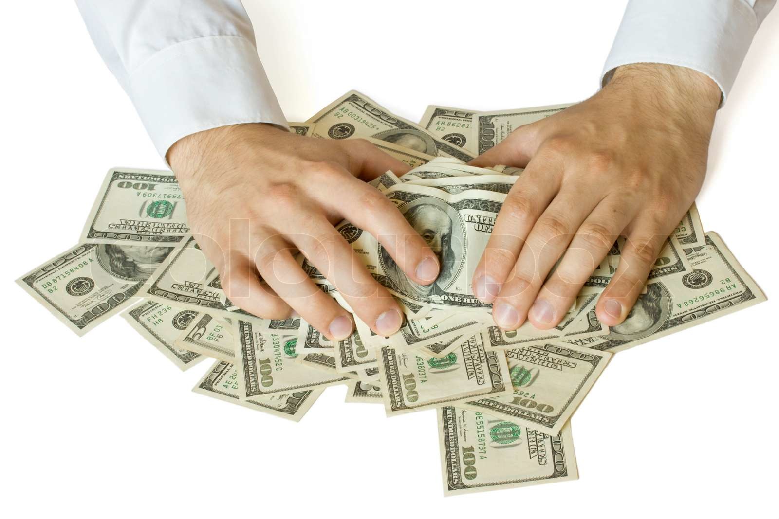 Greedy hands grabbing money lot of dollars | Stock image | Colourbox