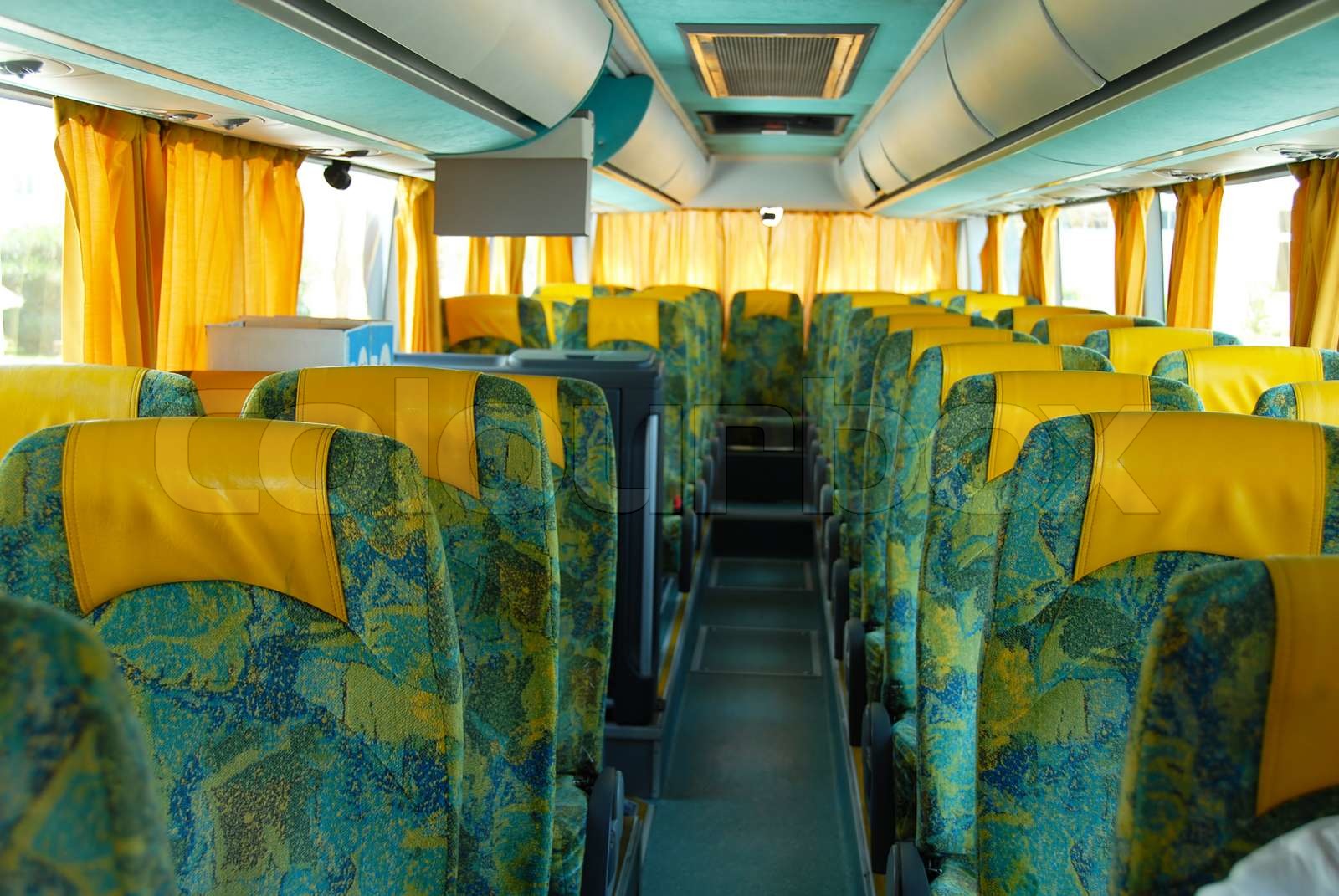 pass in tourist bus with yellow curtains inside | Stock image | Colourbox