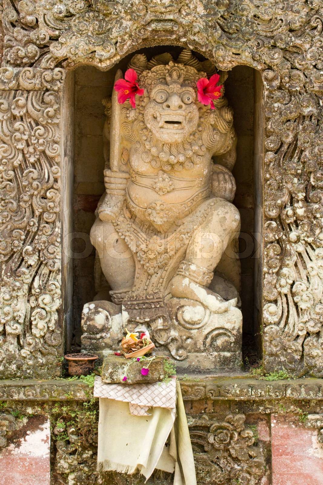 Sten statue af en gud i hinduistisk tempel | Stock foto | Colourbox
