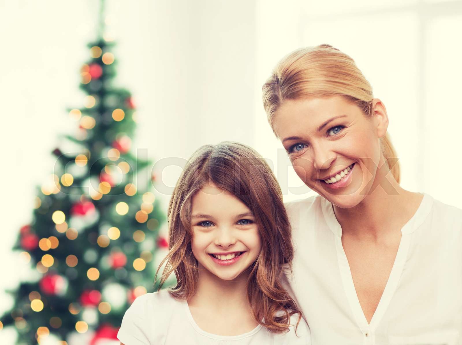 smiling mother and little girl | Stock image | Colourbox