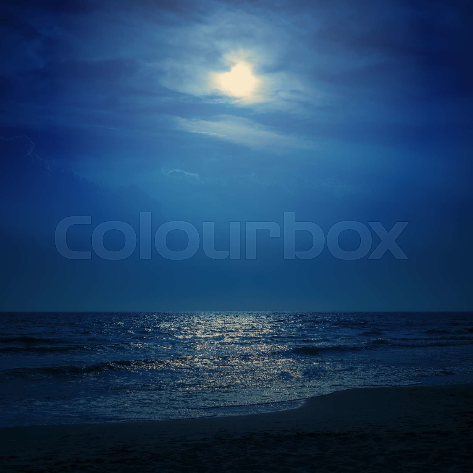 moon light in dark blue sky over sea | Stock image | Colourbox