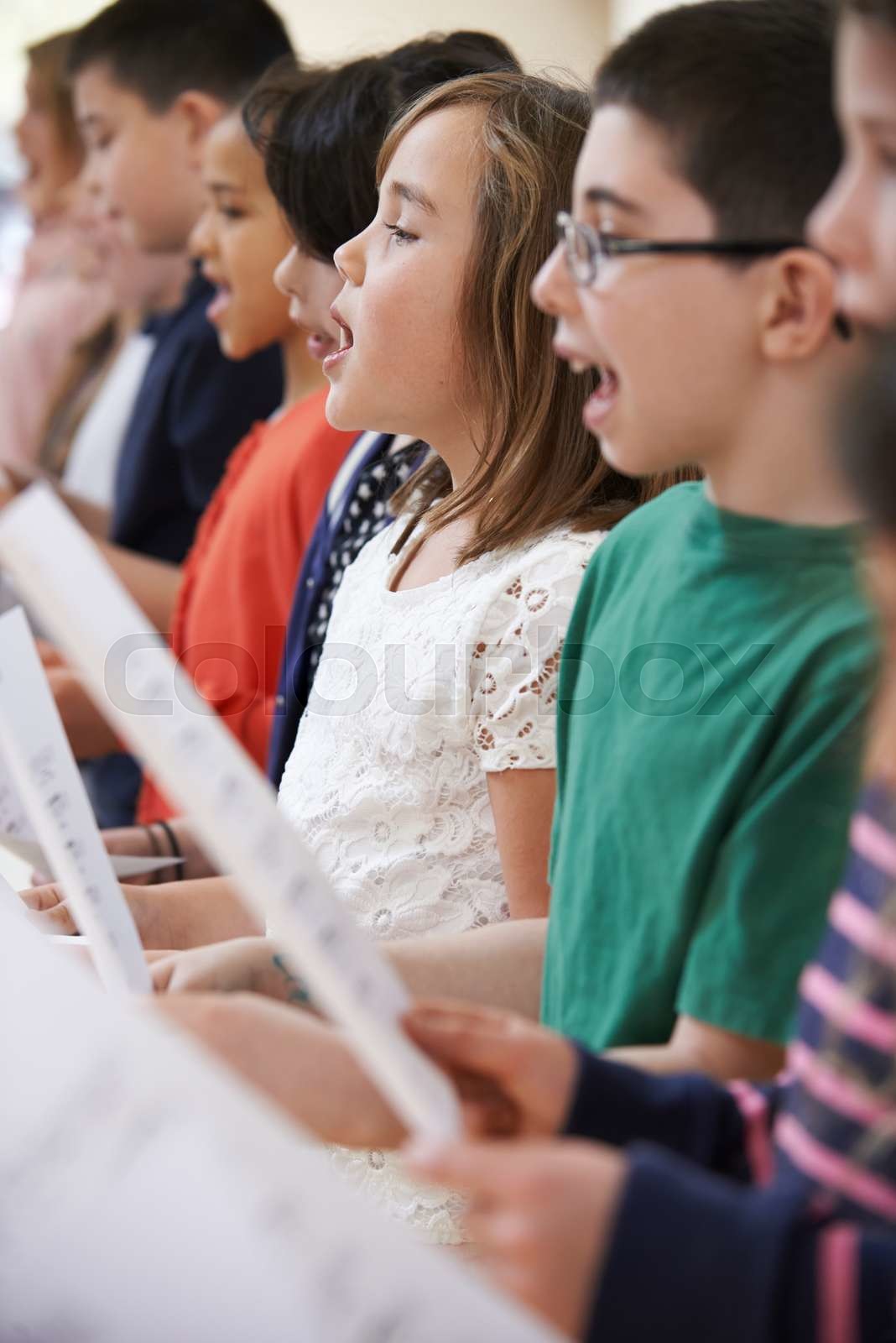 Group Of School Children Singing In Choir Together | Stock image ...