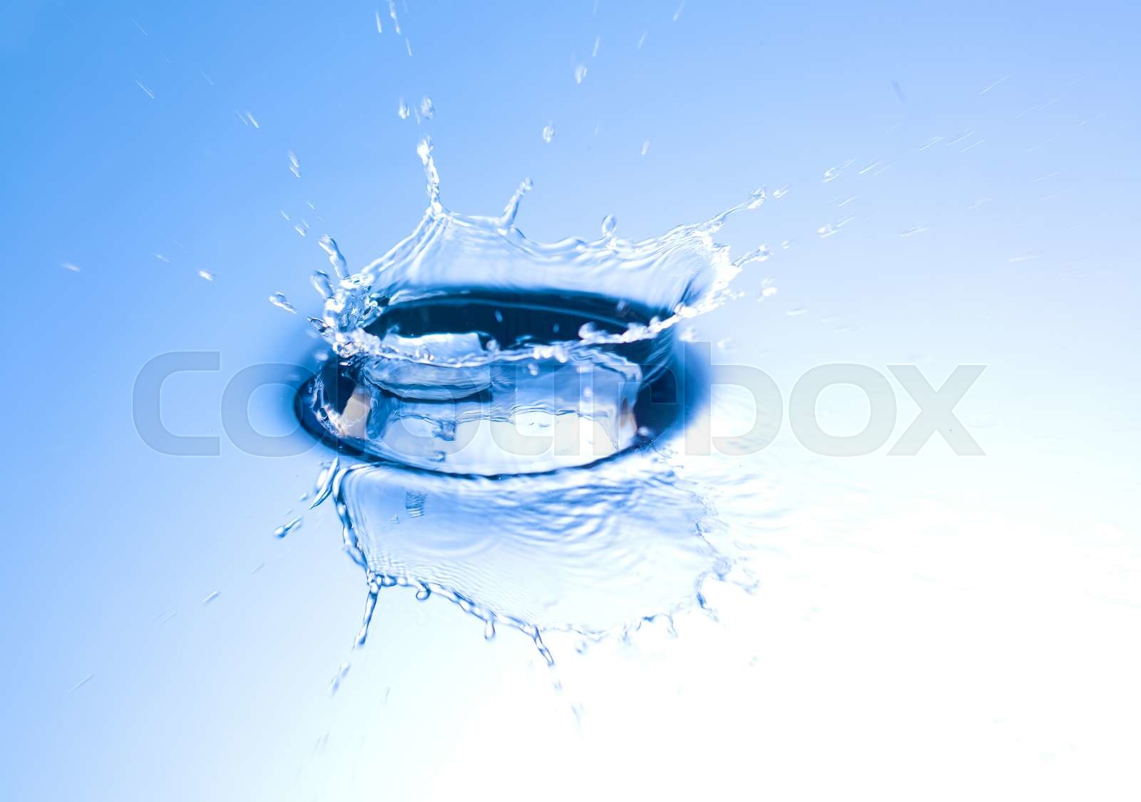 Spark / Splash of blue water | Stock image | Colourbox