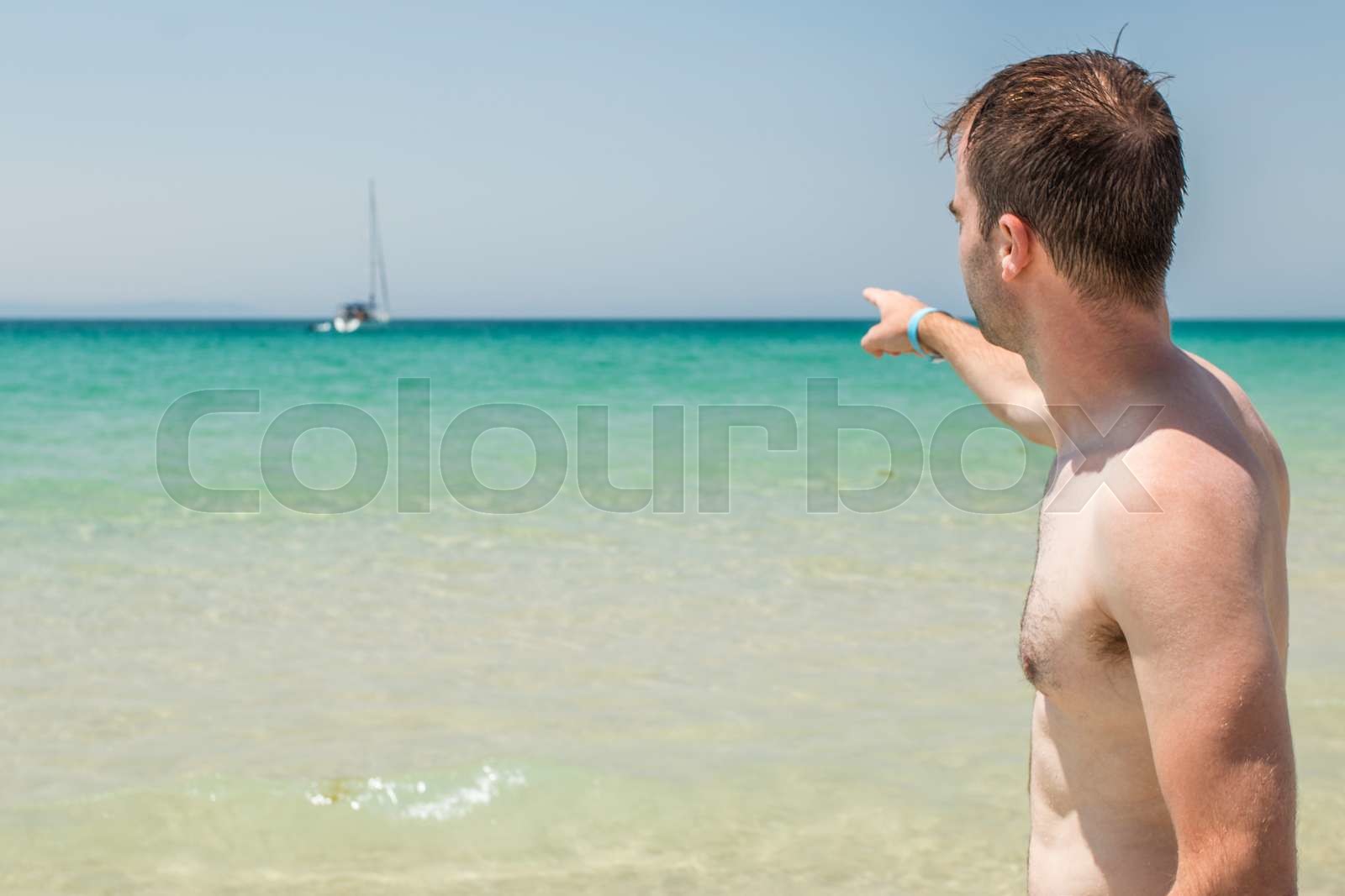 Man pointing a boat | Stock image | Colourbox