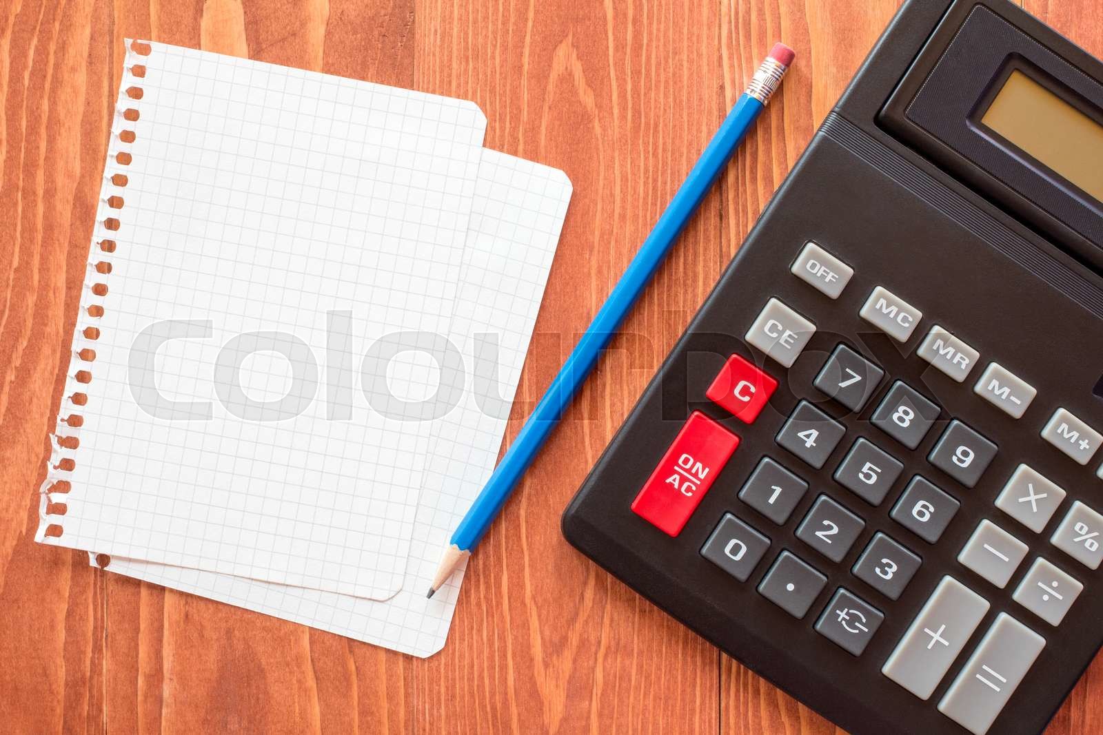Paper sheets and calculator | Stock image | Colourbox