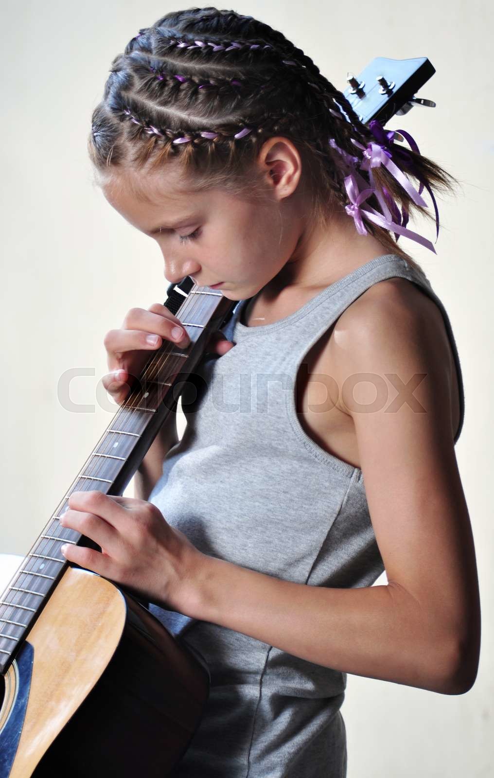 young teenage girl with guitar | Stock image | Colourbox