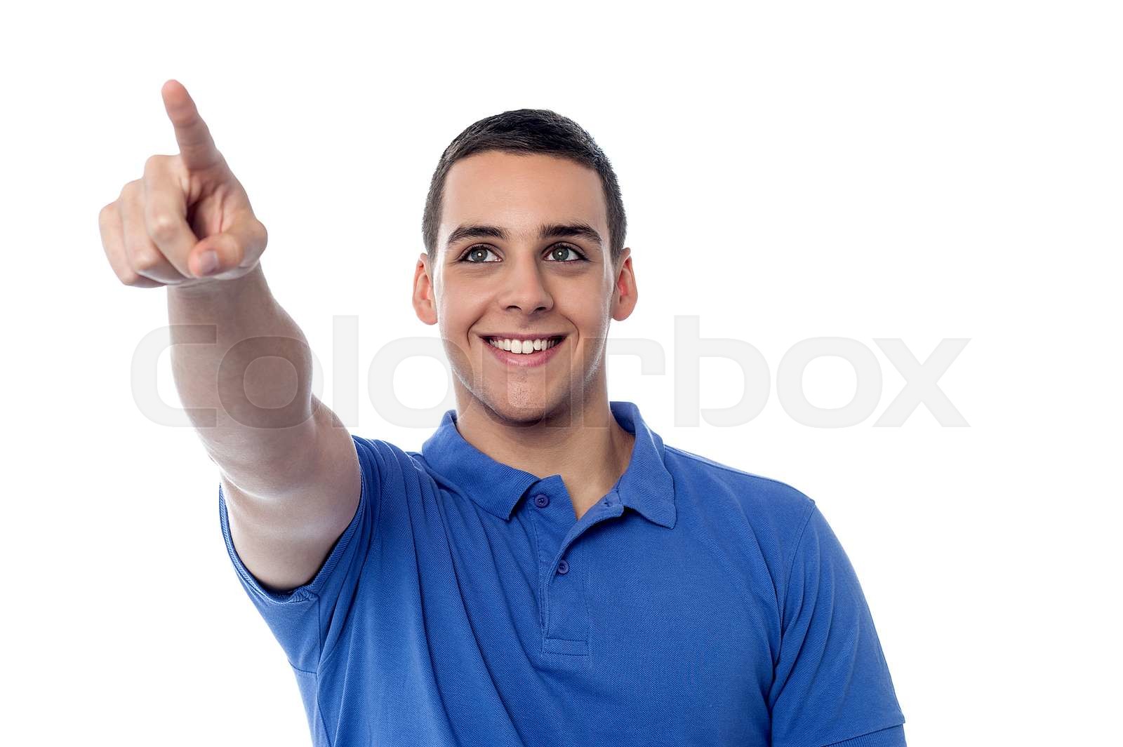 Guy pointing at something | Stock image | Colourbox
