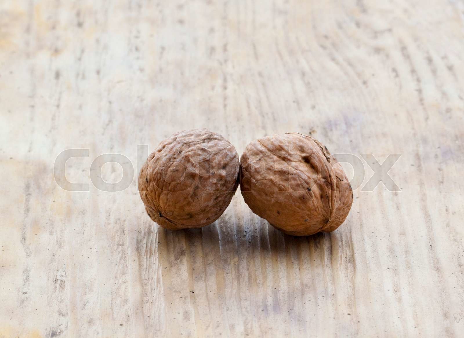 two walnuts | Stock image | Colourbox