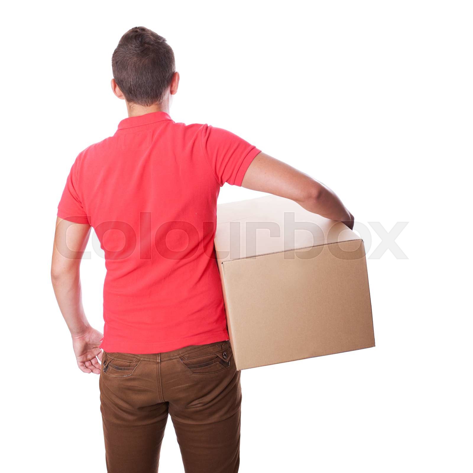 Smiling delivery man is holding a paper box. Back view. | Stock image ...