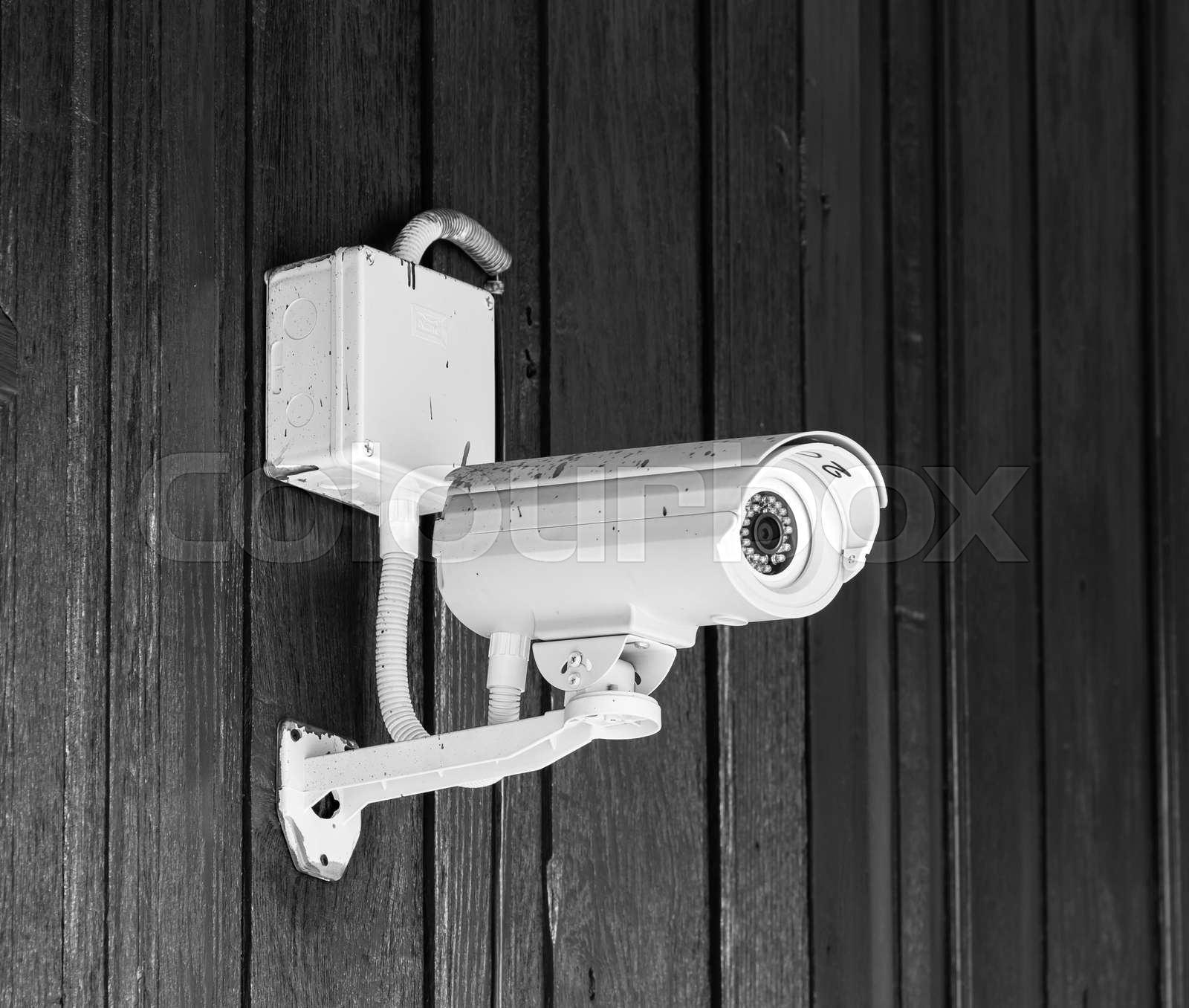 CCTV camera. Security camera on the wall | Stock image | Colourbox