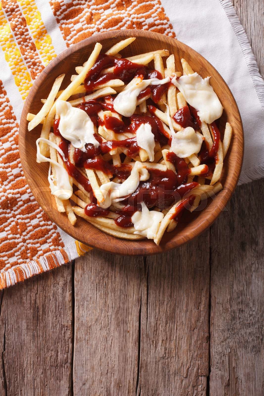 french fries with gravy and cheese. vertical top view | Stock image ...
