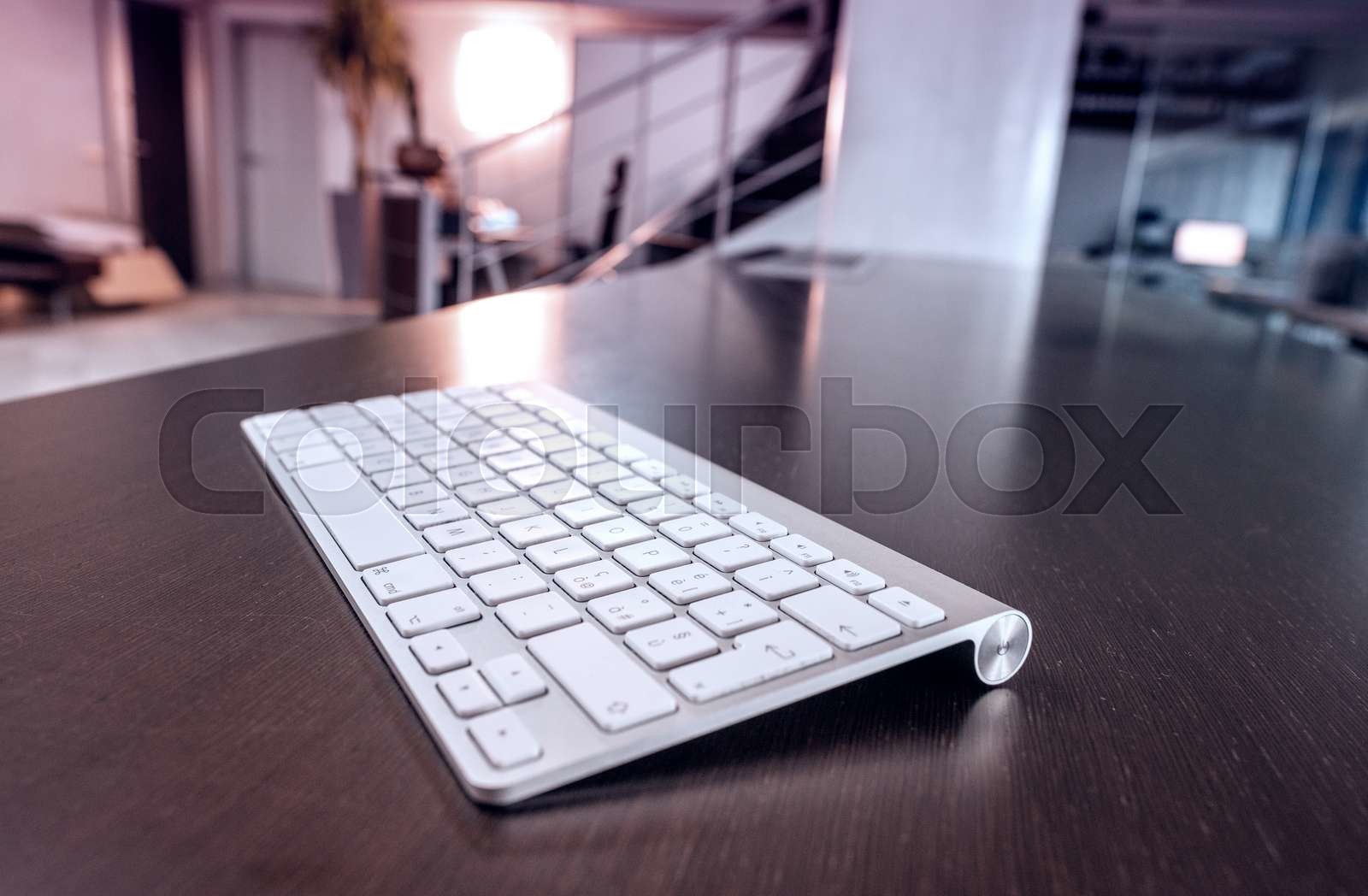 Wireless keyboard on a modern office desk | Stock image | Colourbox