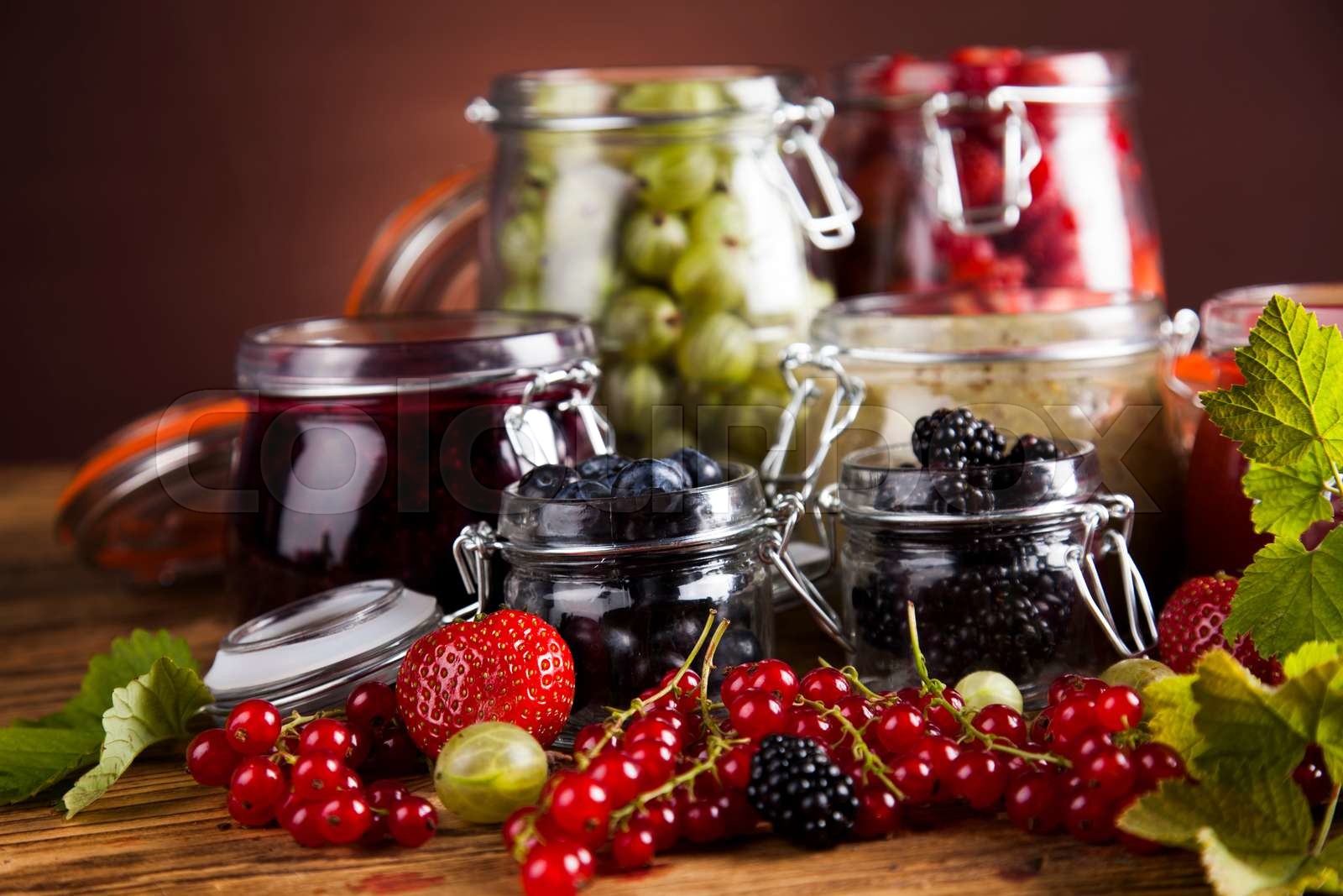 Fresh berries and wild berry jam | Stock image | Colourbox