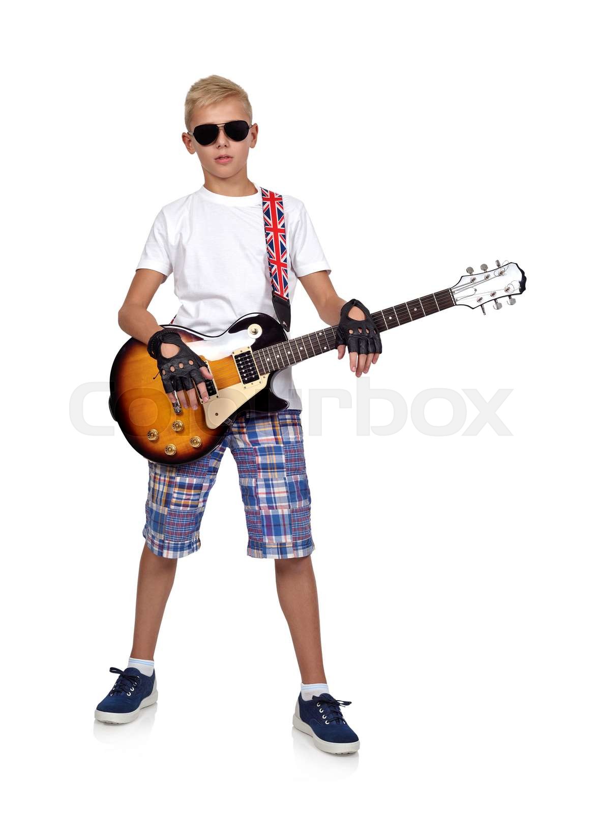 young rocker boy with guitar | Stock image | Colourbox
