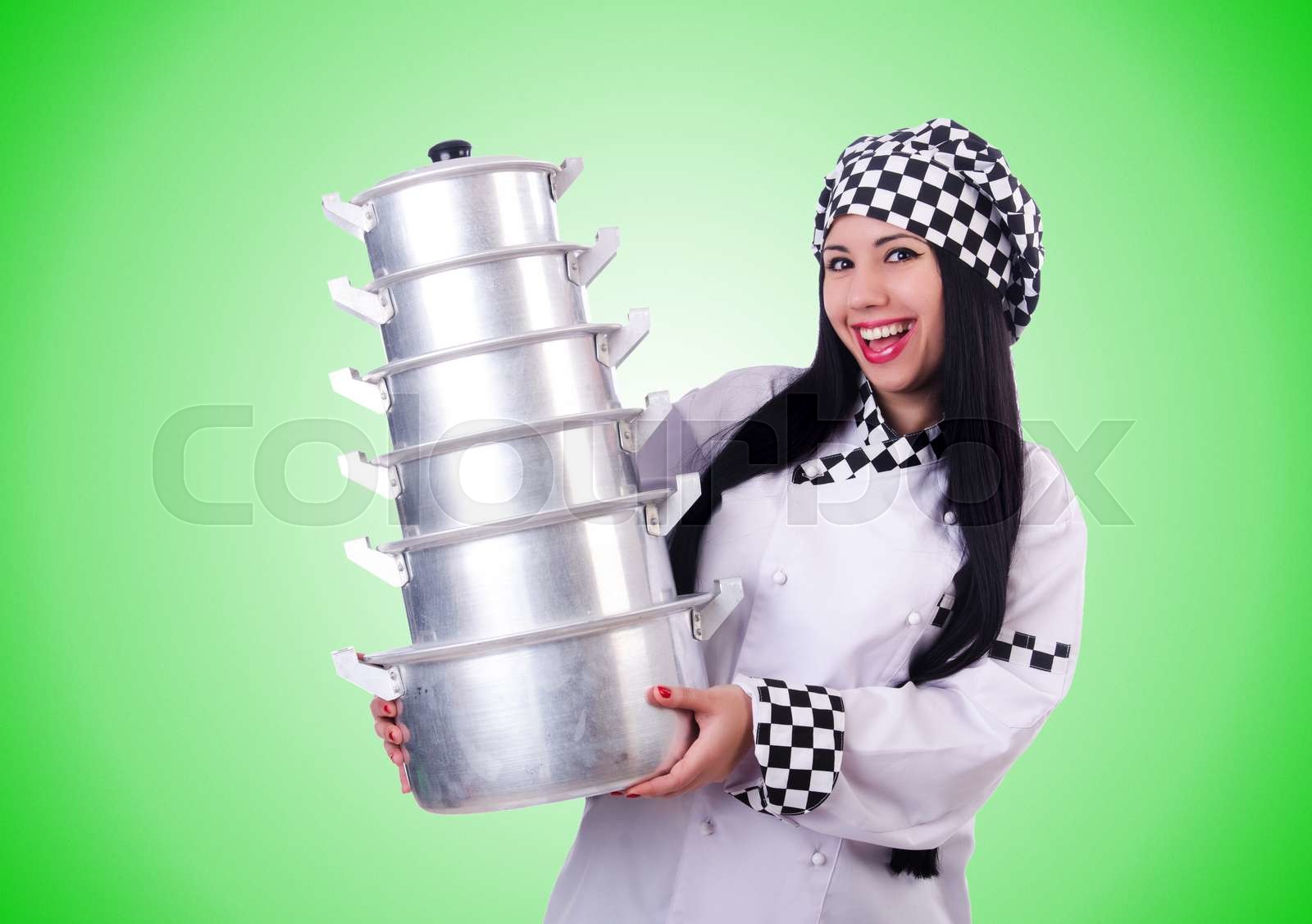 Cook with stack of pots on white | Stock image | Colourbox