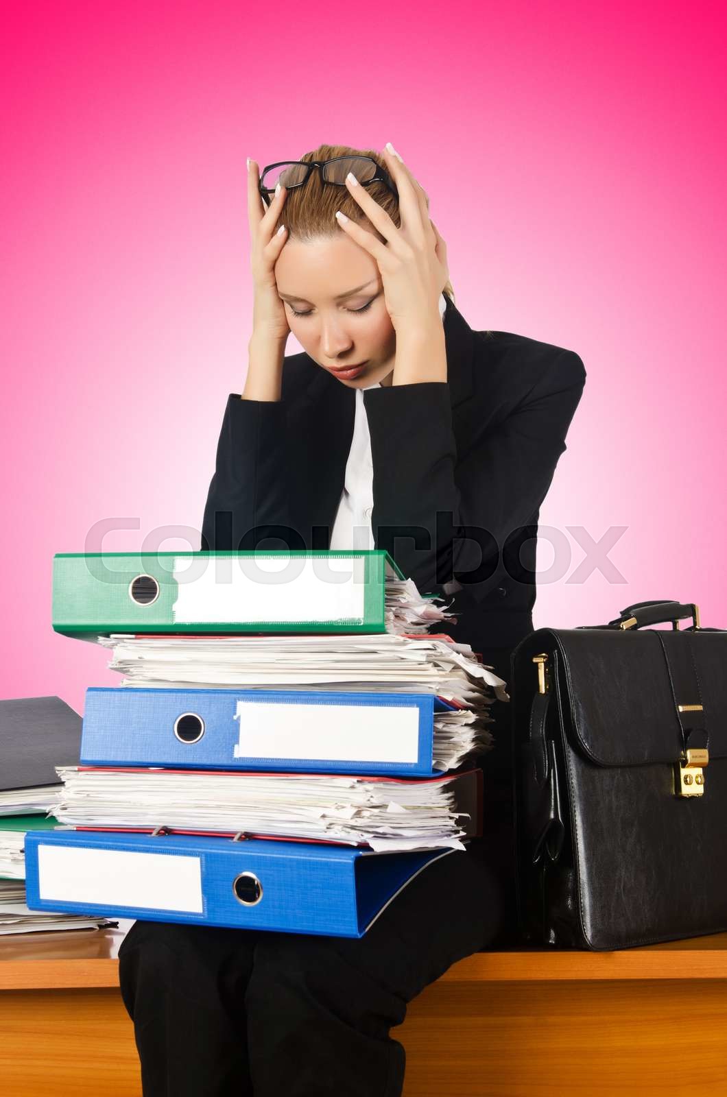 Woman with lots of work | Stock image | Colourbox