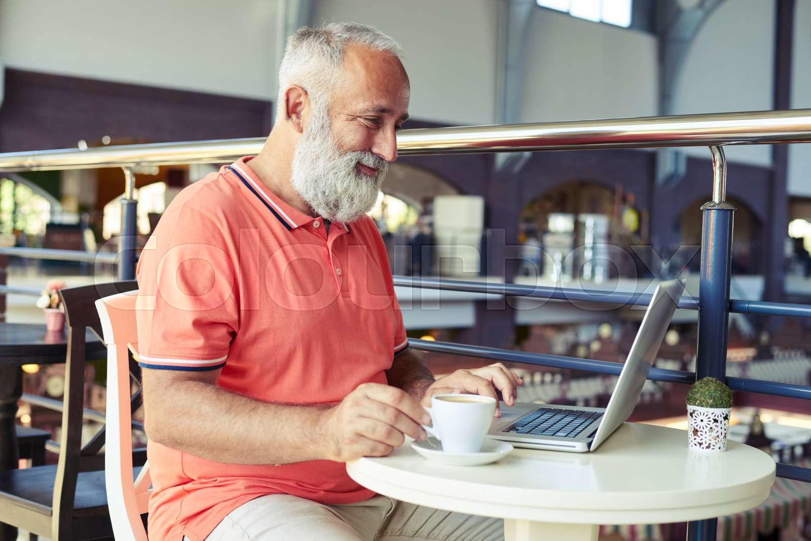 man with cup of coffee working | Stock image | Colourbox