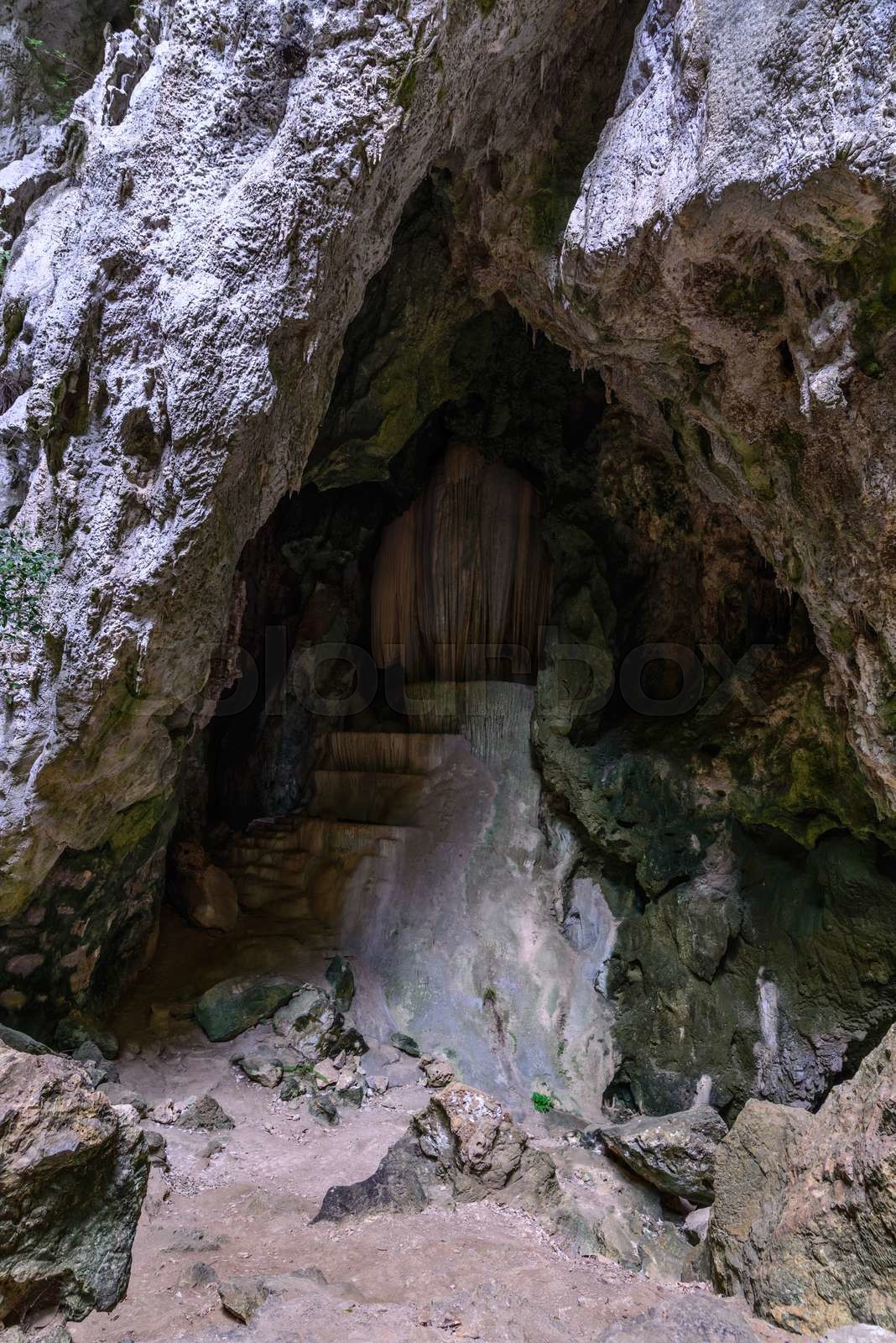 Limestone like staircase inside cave in deep forest. | Stock image ...
