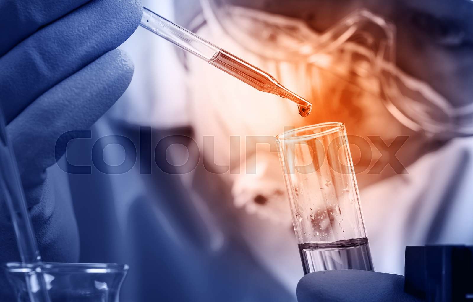 Hands of clinician holding tools during scientific experiment in ...