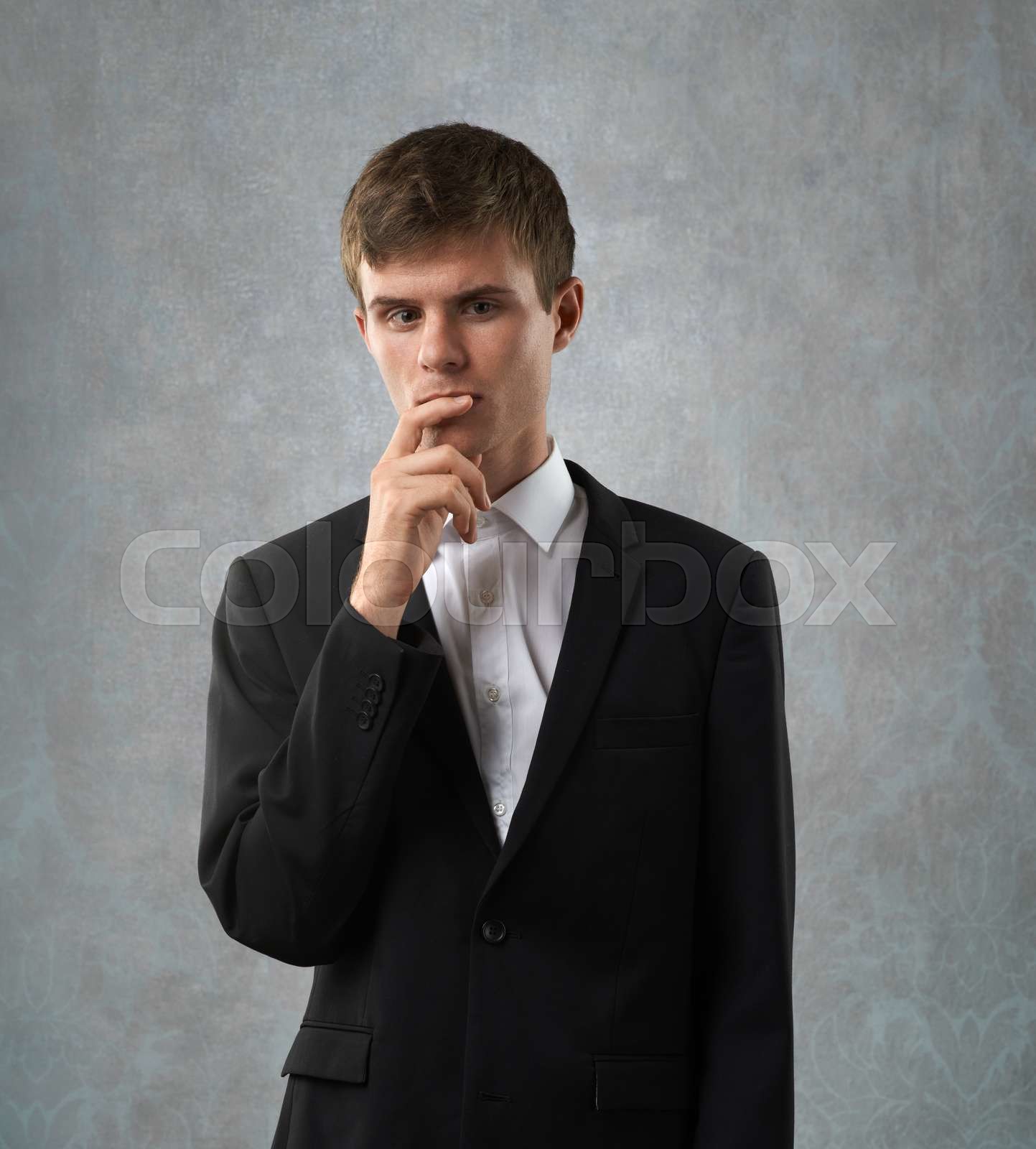 man is staying and thinking about something | Stock image | Colourbox