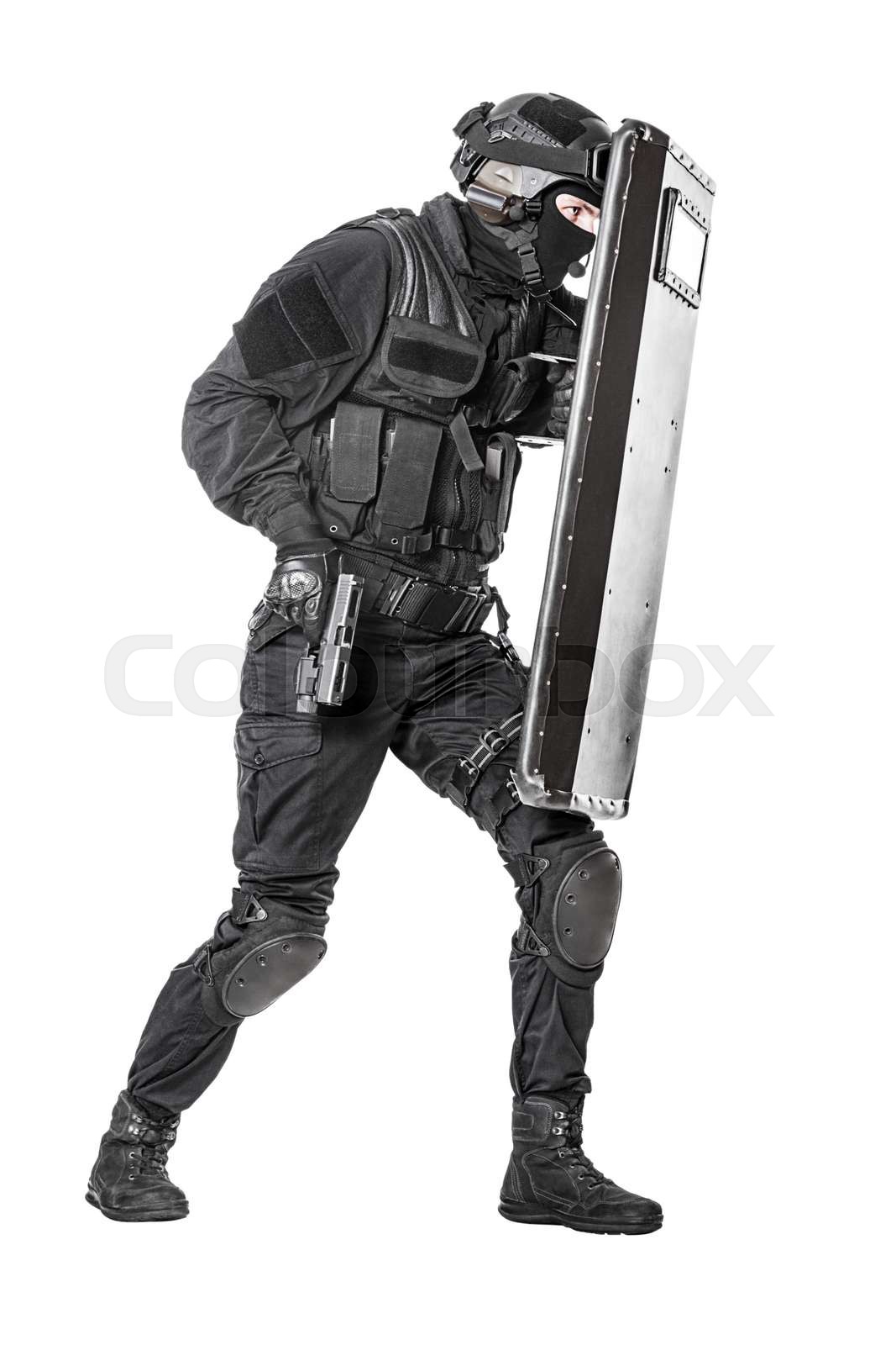 SWAT officer with ballistic shield | Stock image | Colourbox