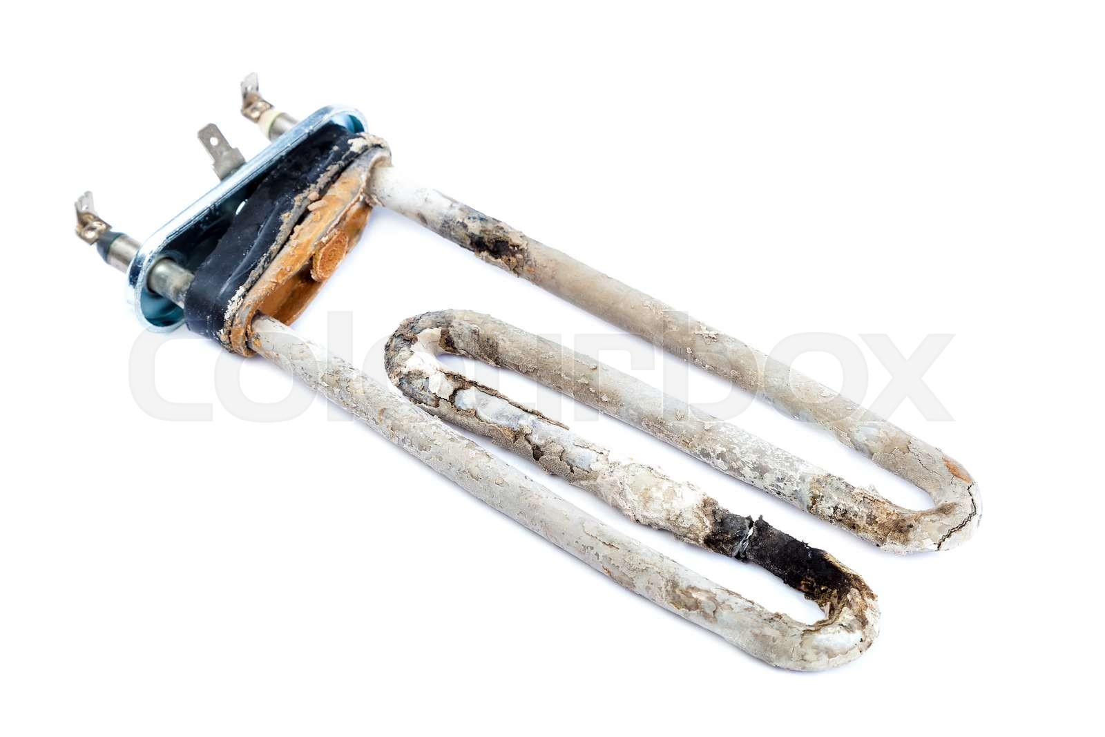 Damaged heating element of the washing machine. | Stock image | Colourbox