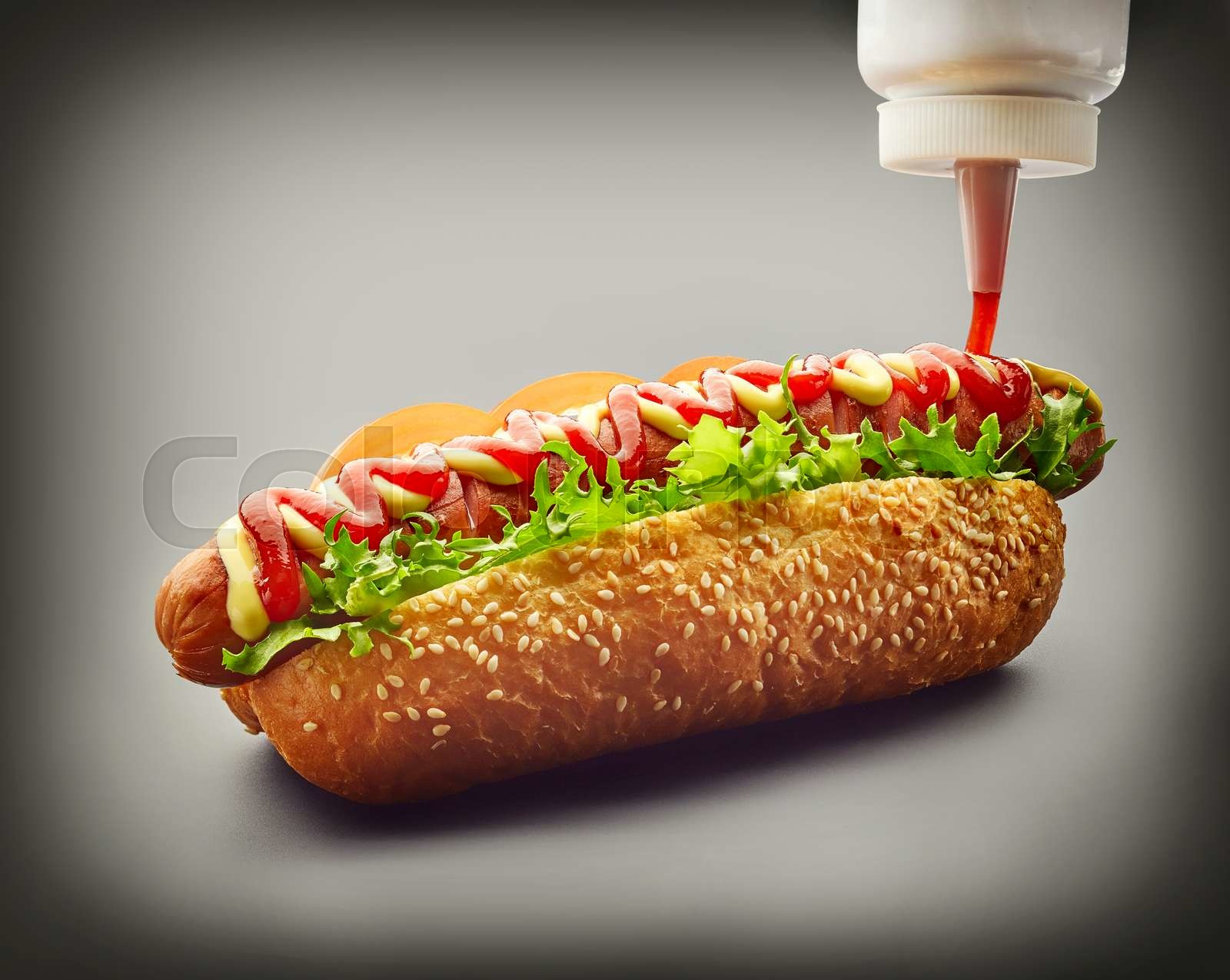 Hot dog with ketchup | Stock image | Colourbox