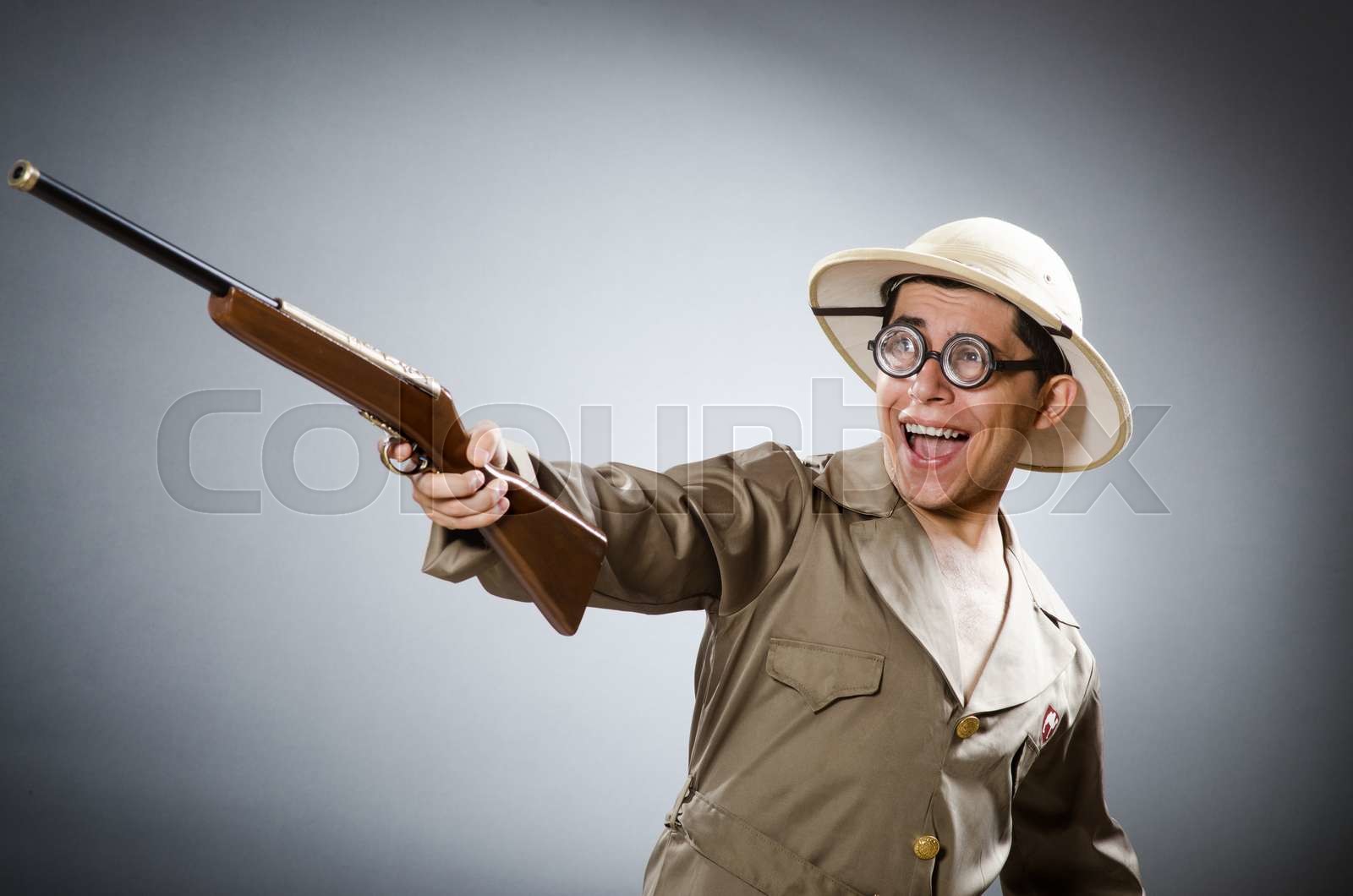 Funny hunter in hunting concept | Stock image | Colourbox