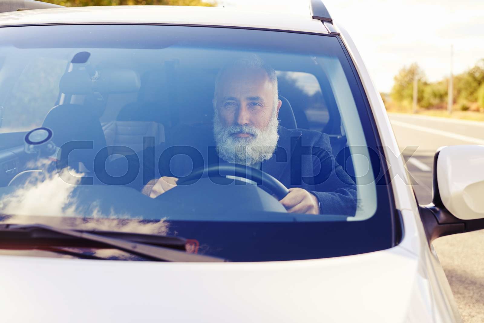 man driving car and looking forward | Stock image | Colourbox