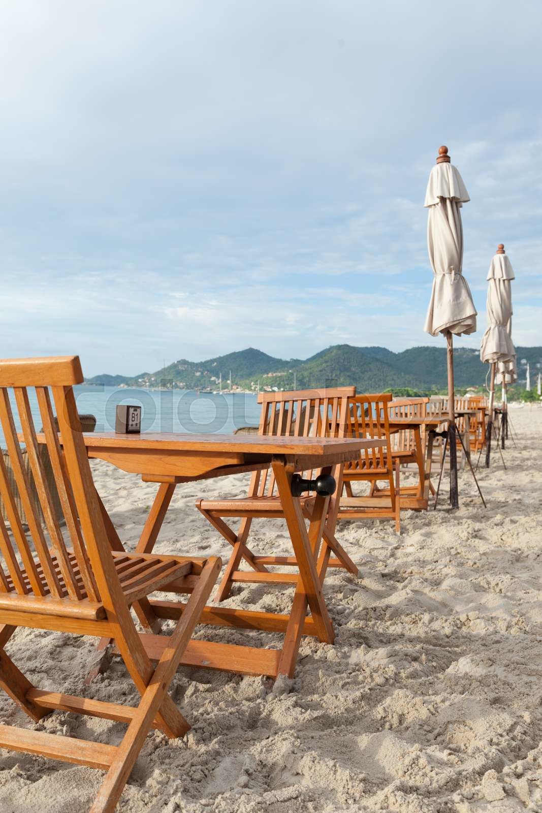 Chairs and tables on the beach | Stock image | Colourbox