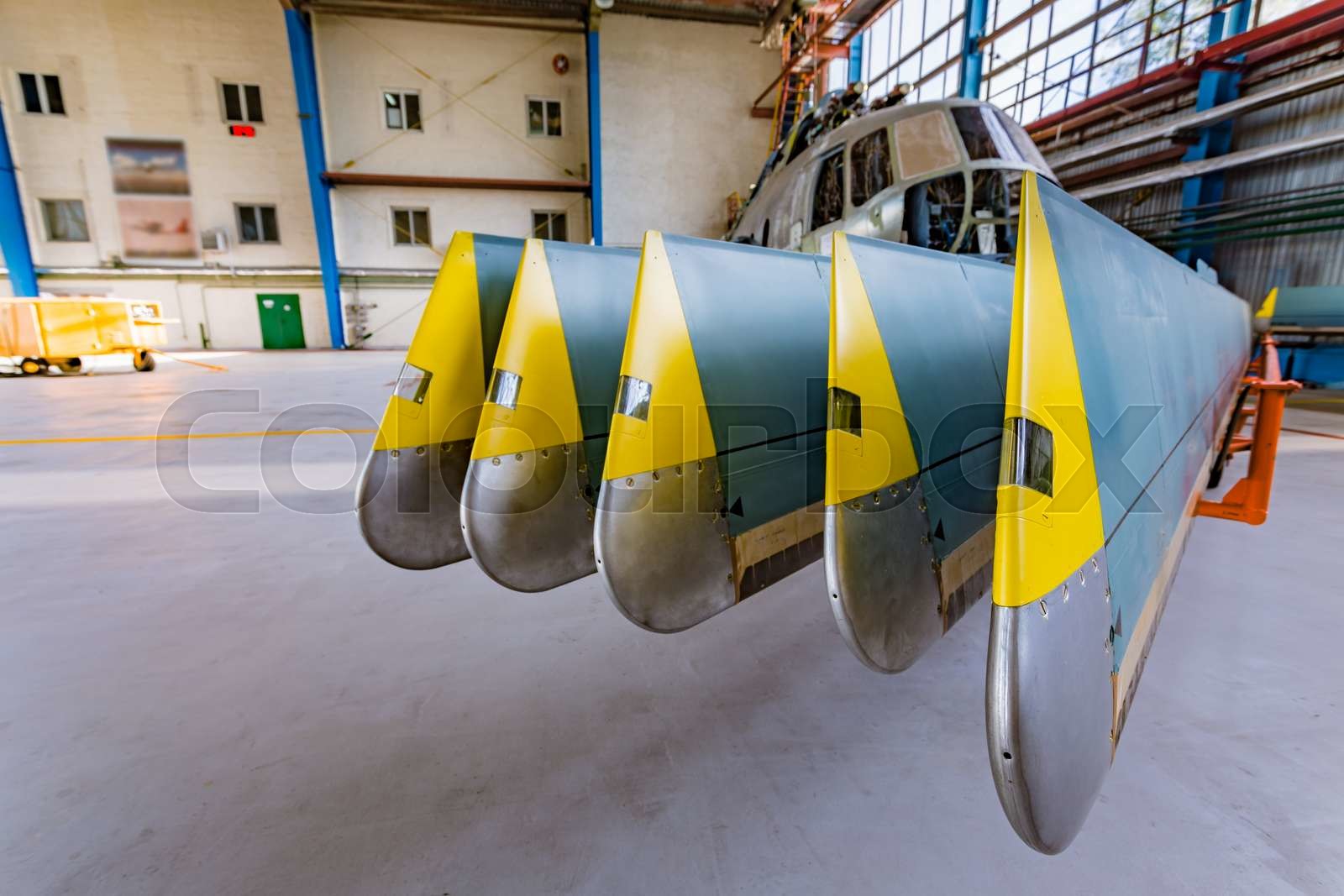 Helicopter rotor blades in hangar | Stock image | Colourbox