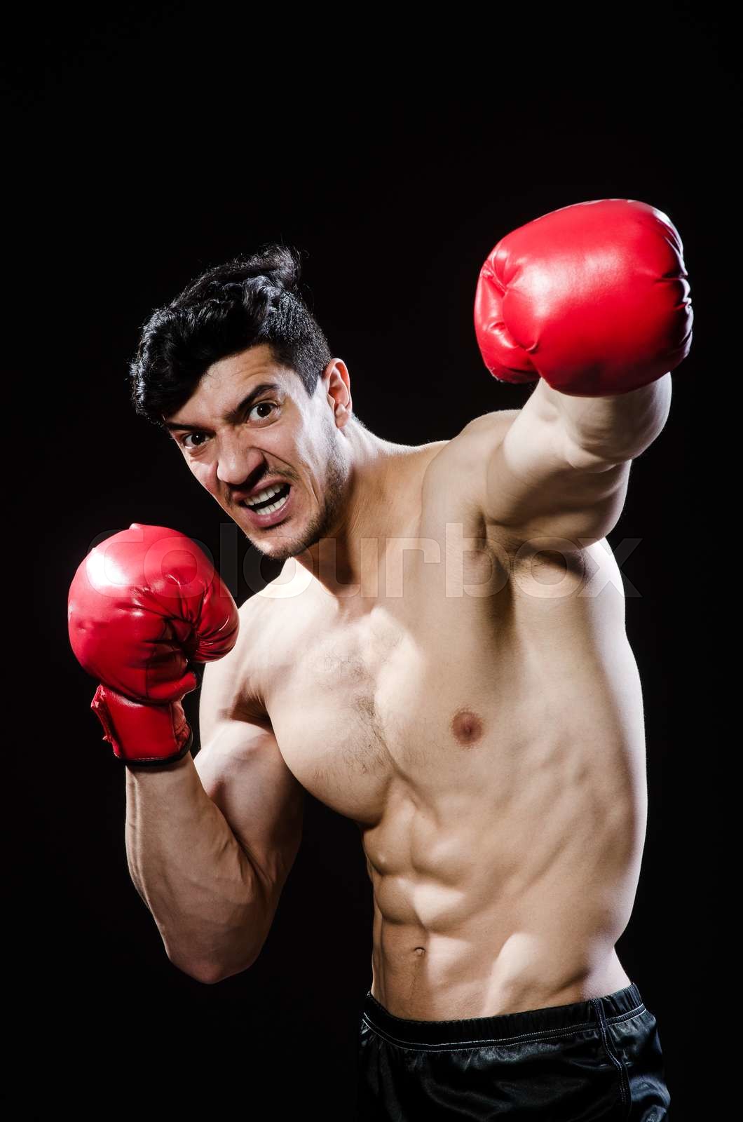 Muscular man in boxing concept | Stock image | Colourbox